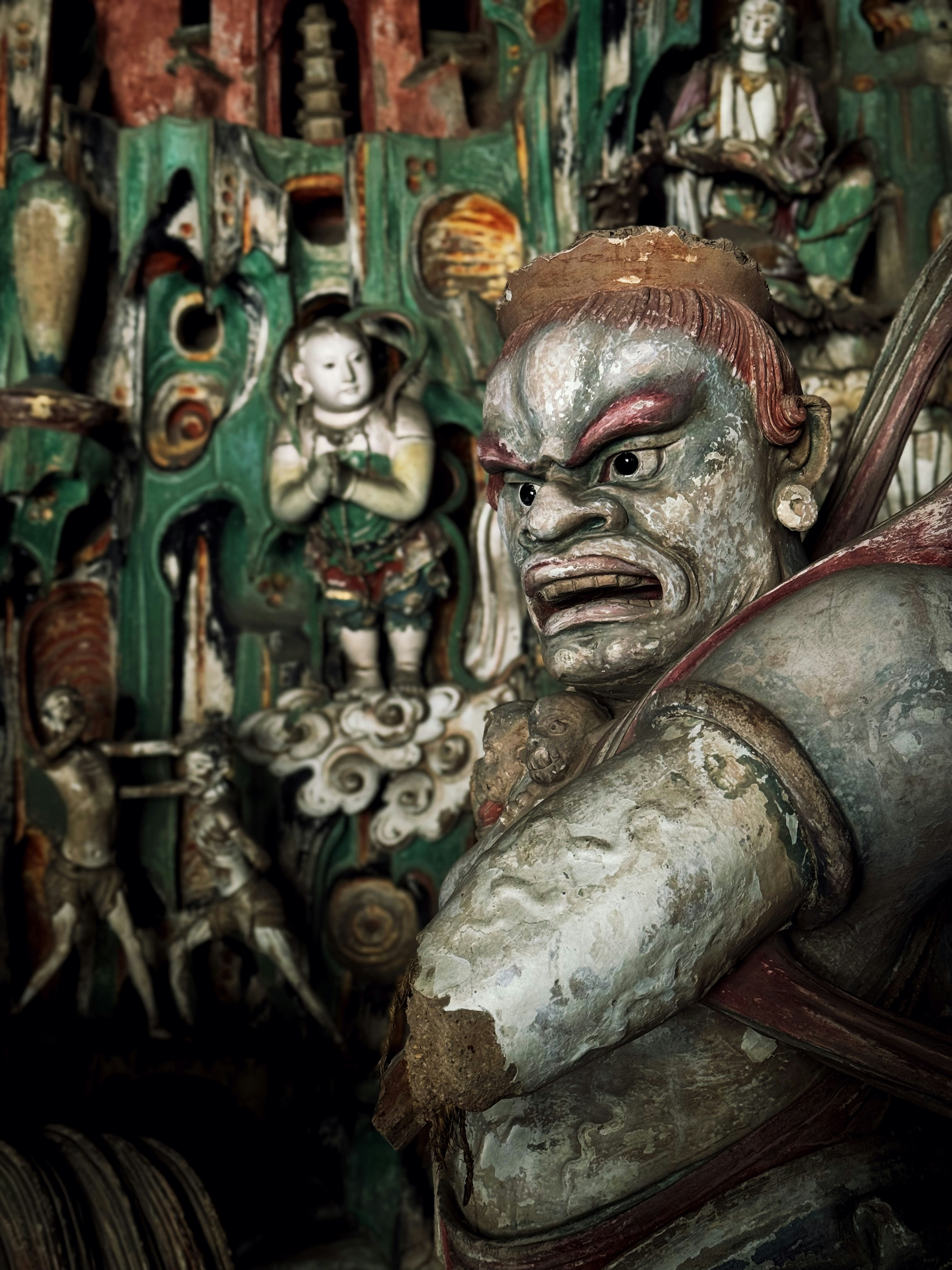 The Sentinel Puppet: weathered guardian of a shrine