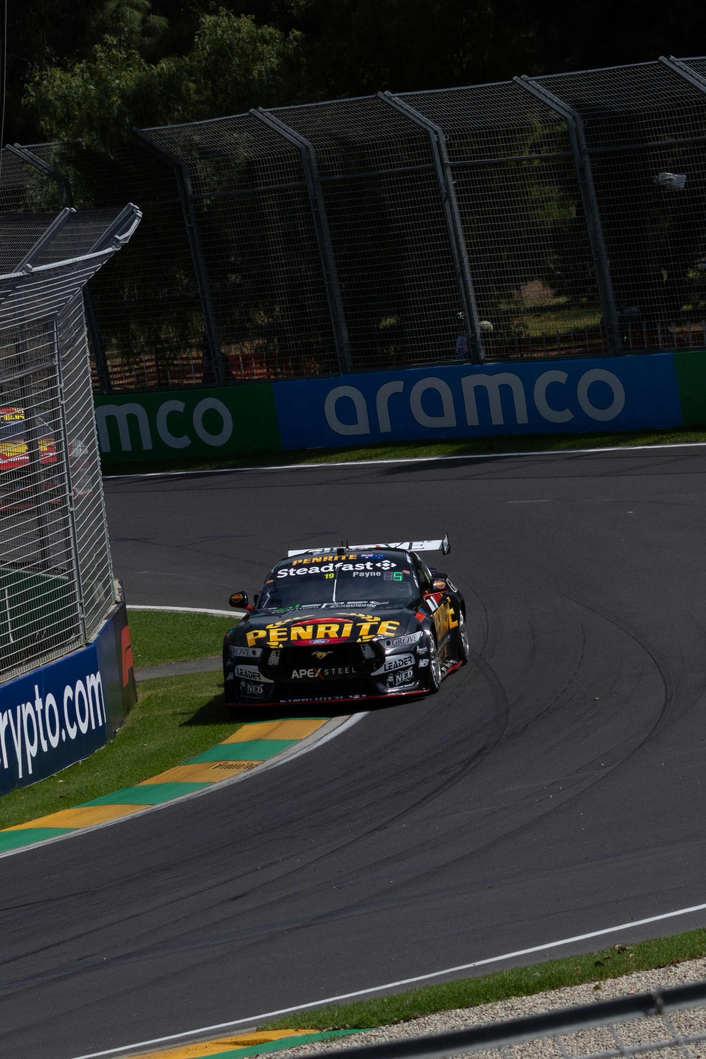 On the Edge of the Curve: Penrite Racing Car Clips the Apex
