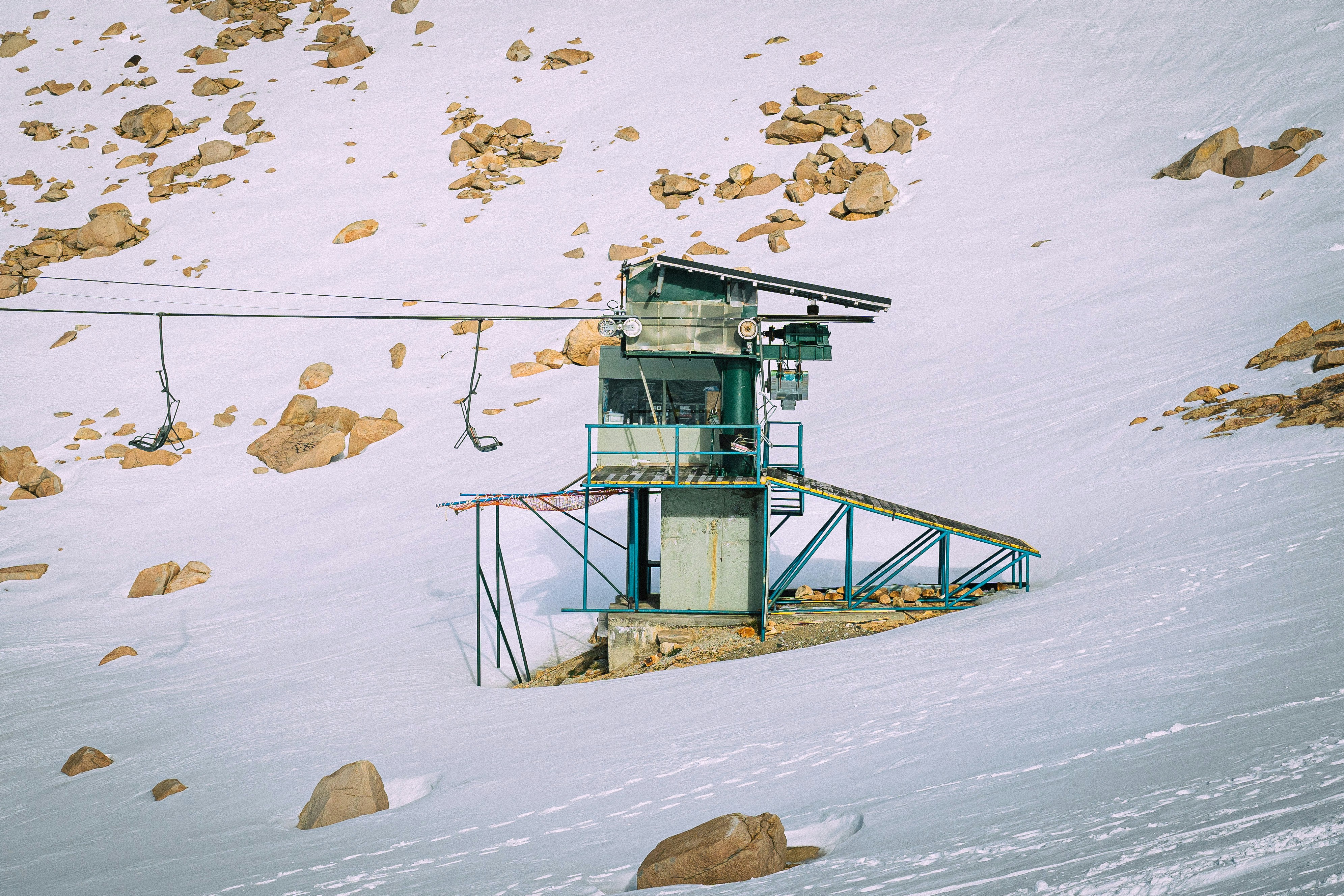 Snowbound Lift Capsule: A Quiet Alpine Outpost in Winter Light