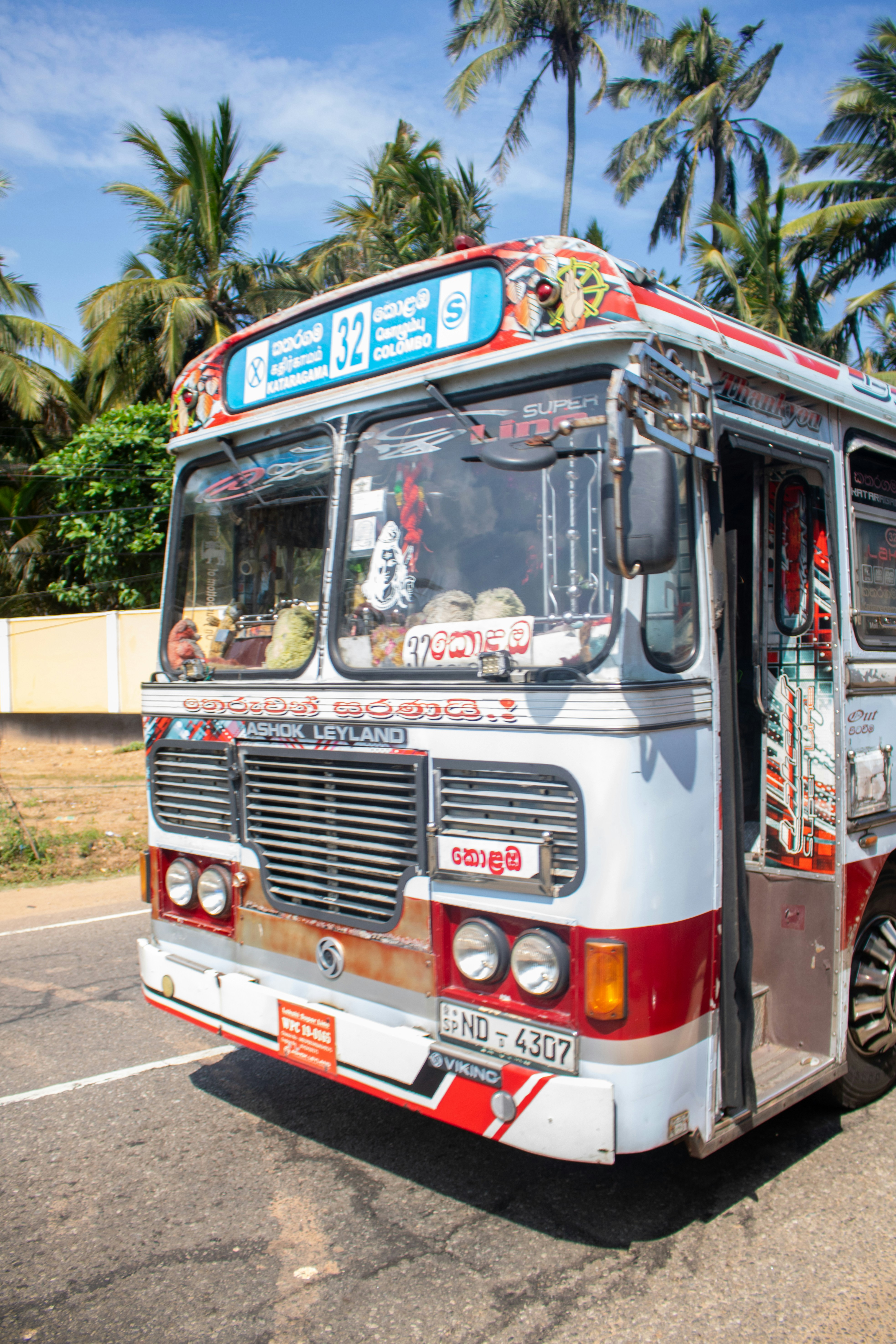 A brightly decorated bus on a sunny day. photo – Free Travel Image on ...