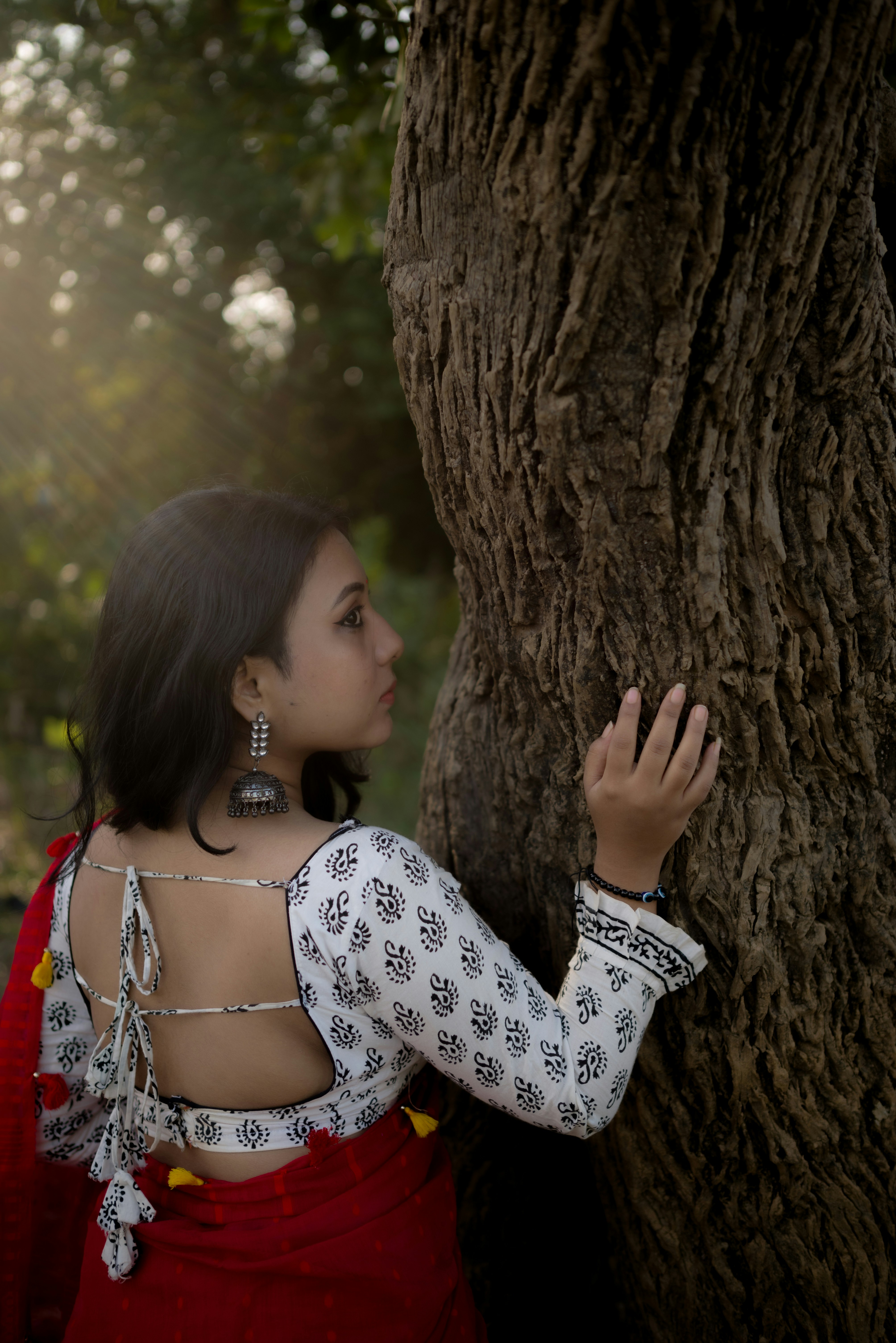Whispering Tree: A Silhouette of Reflection and Contact