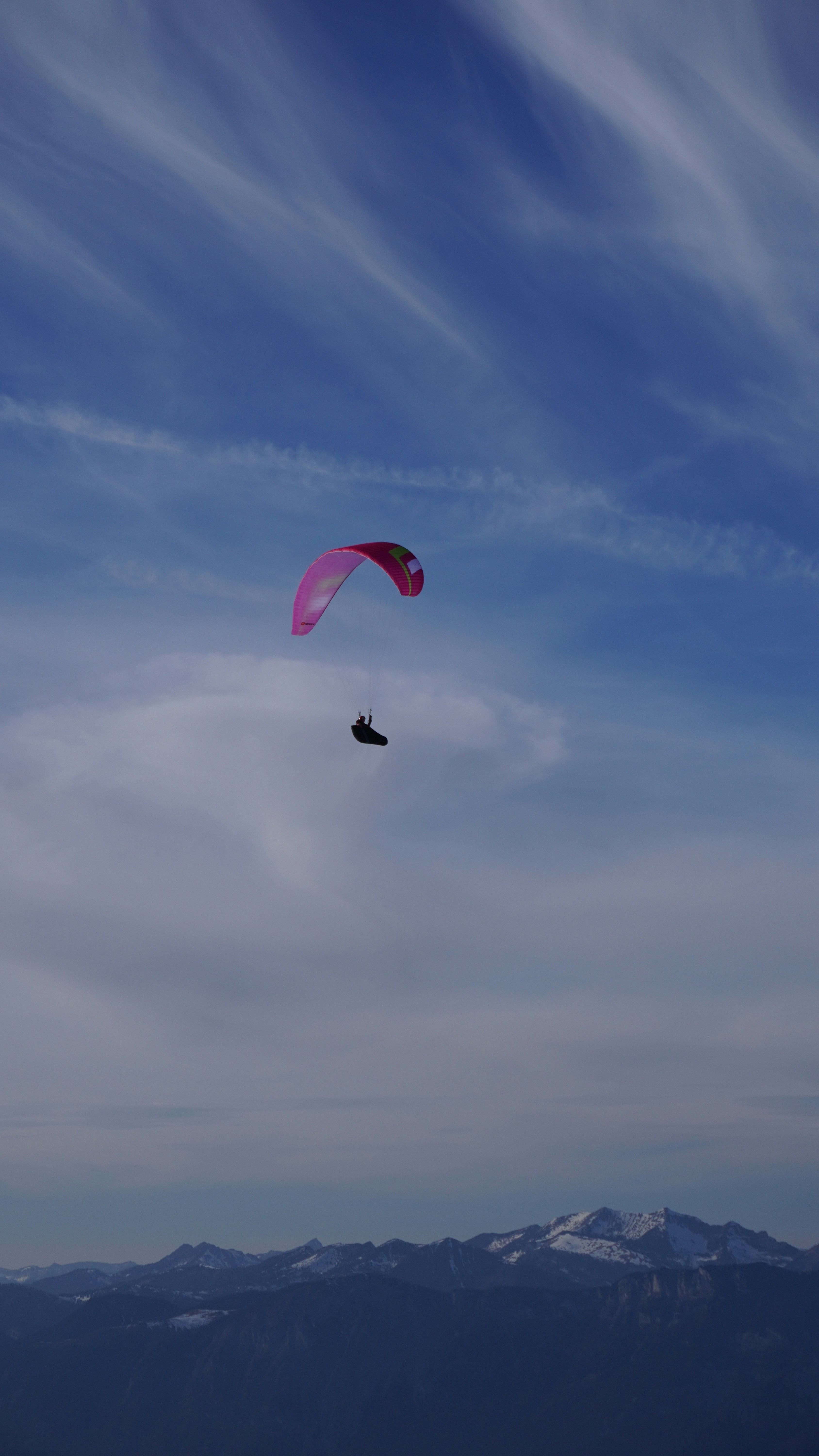 Skyward Flight Over Mountain Peaks