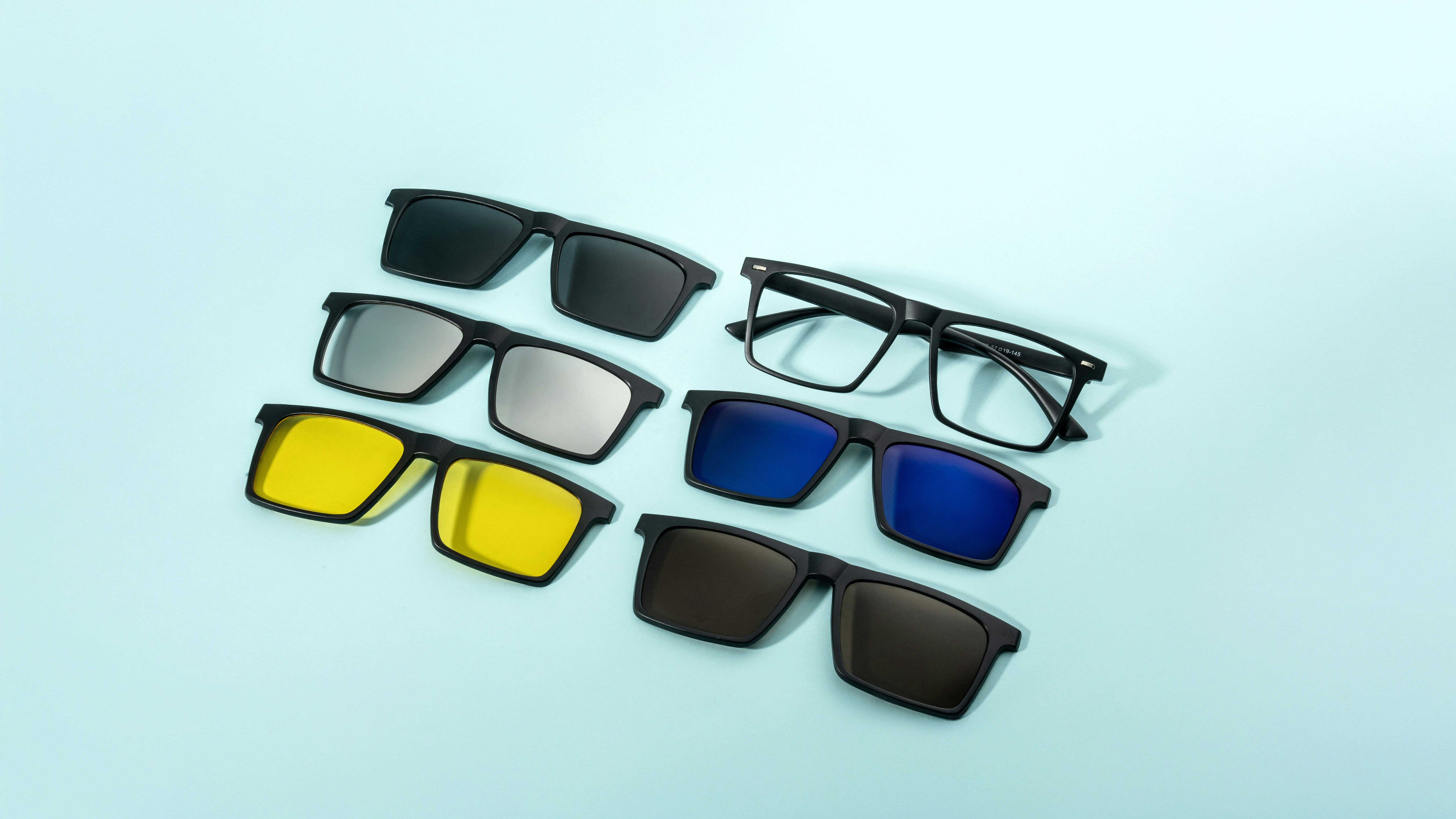 Different types of eyeglasses and sunglasses are displayed. photo ...