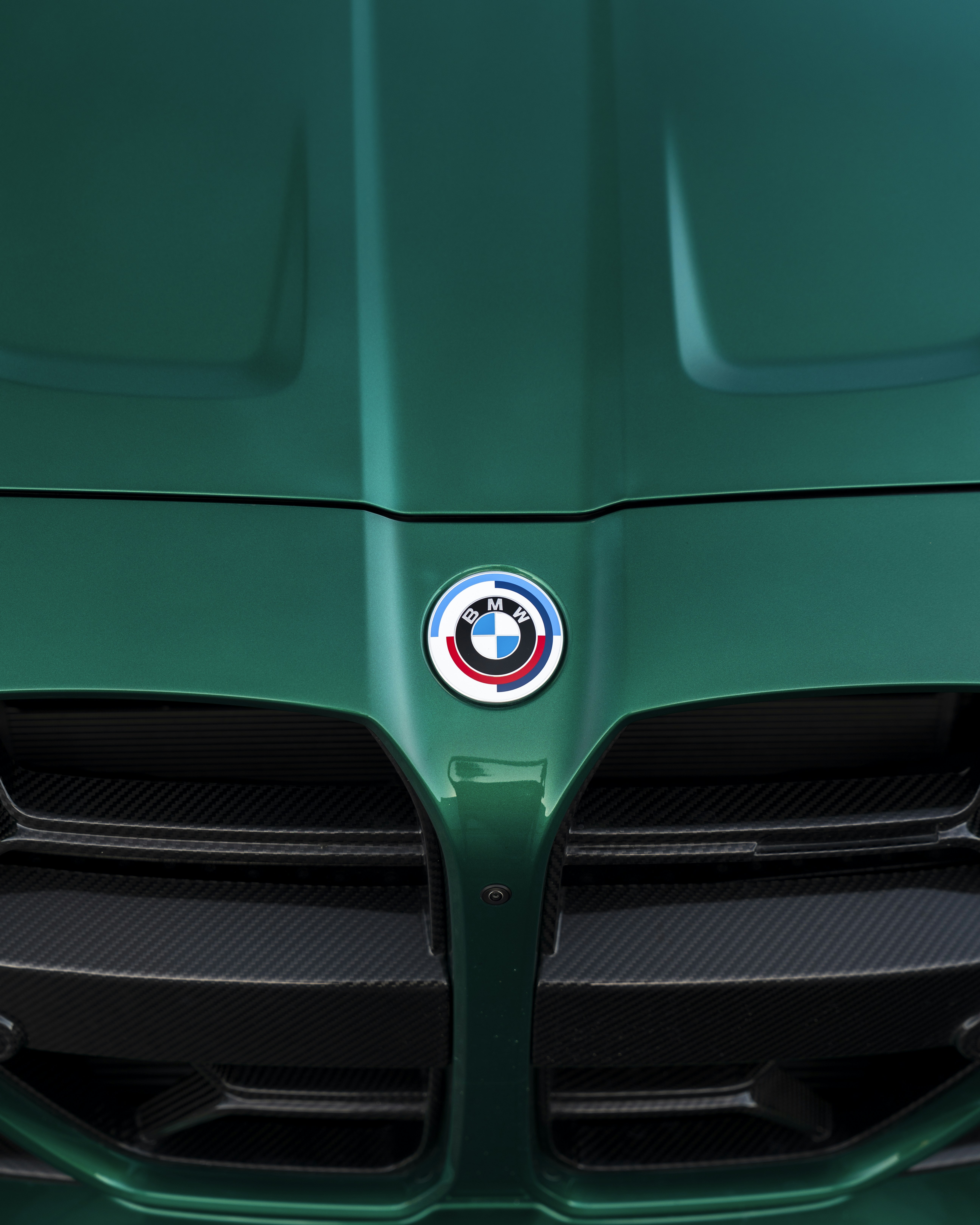 A green BMW m3 grille. photo – Free Car Image on Unsplash