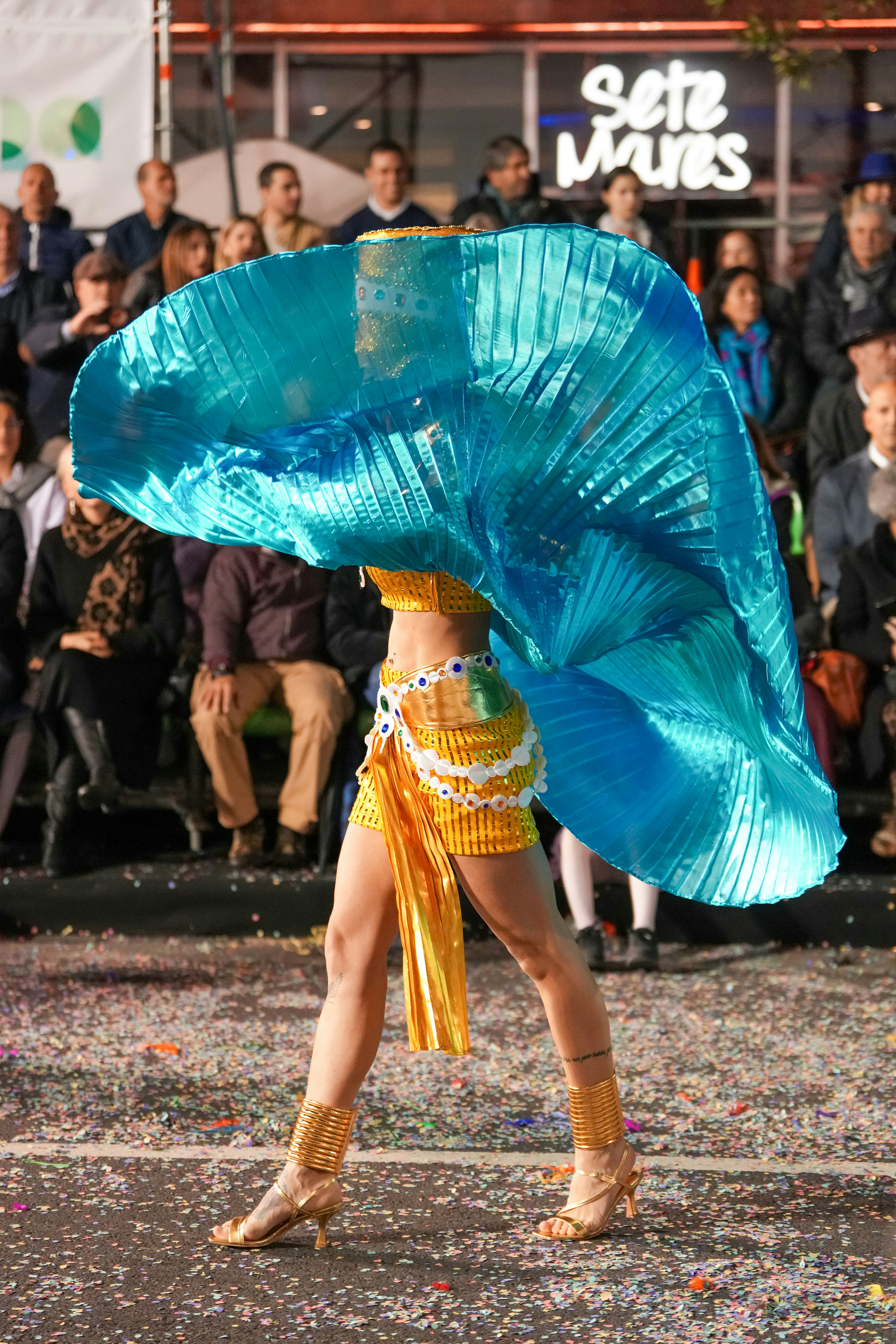 Blue Silk Soaring: A Parade of Color and Rhythm