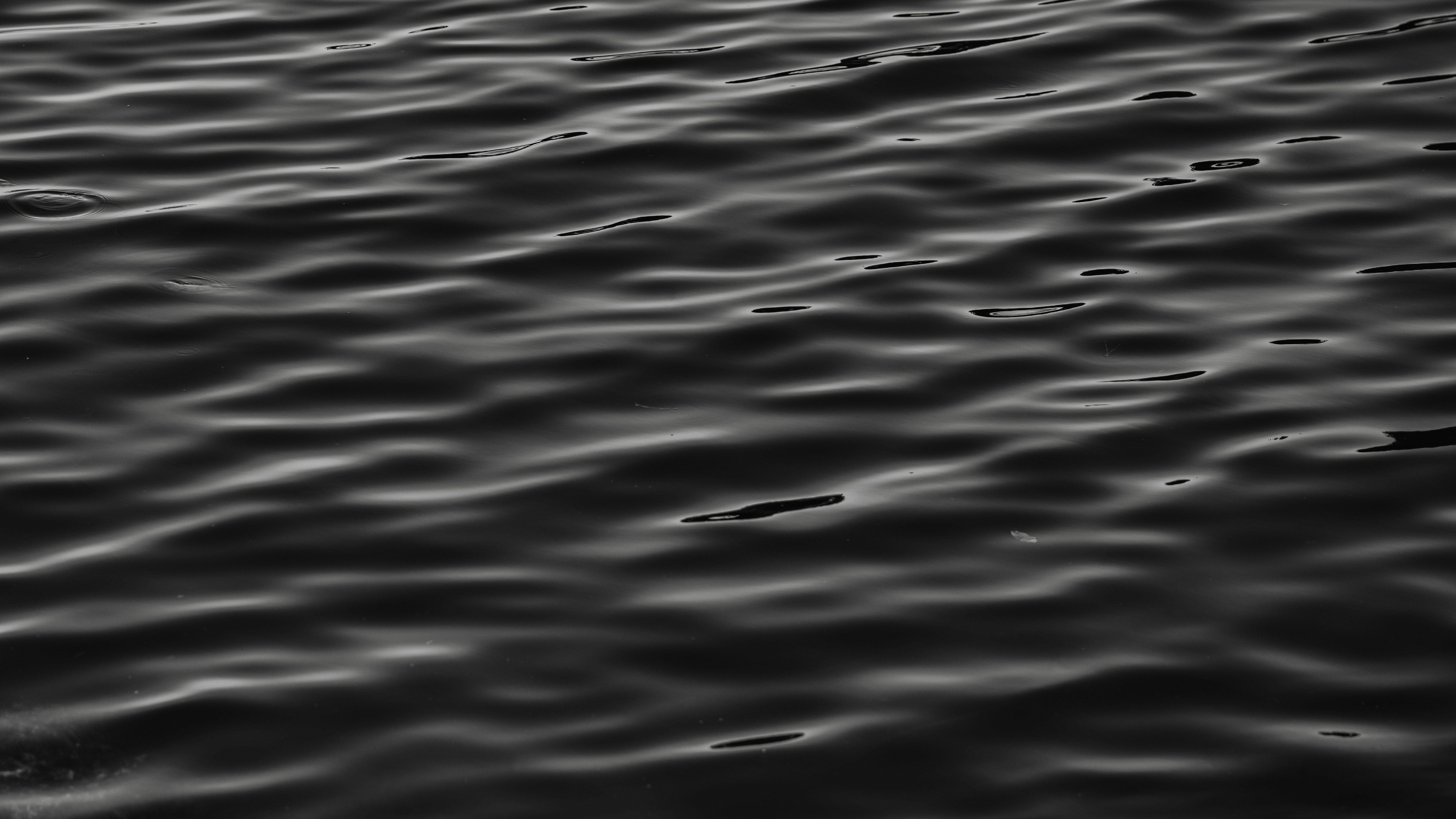 Dark water surface with gentle ripples. photo – Free Wallpaper Image on ...