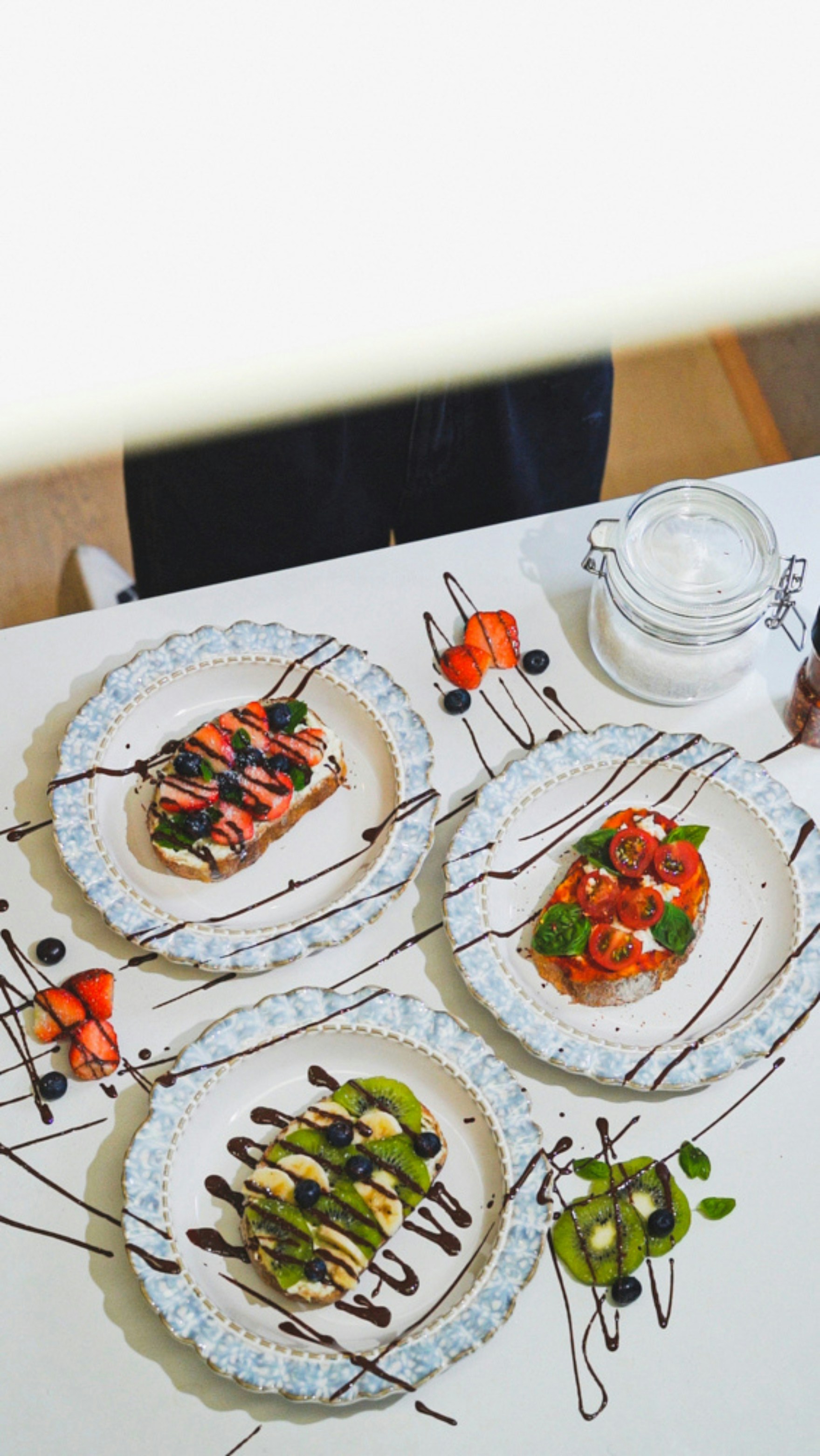 Three types of decorated toasts sit on plates. photo – Free Food Image ...