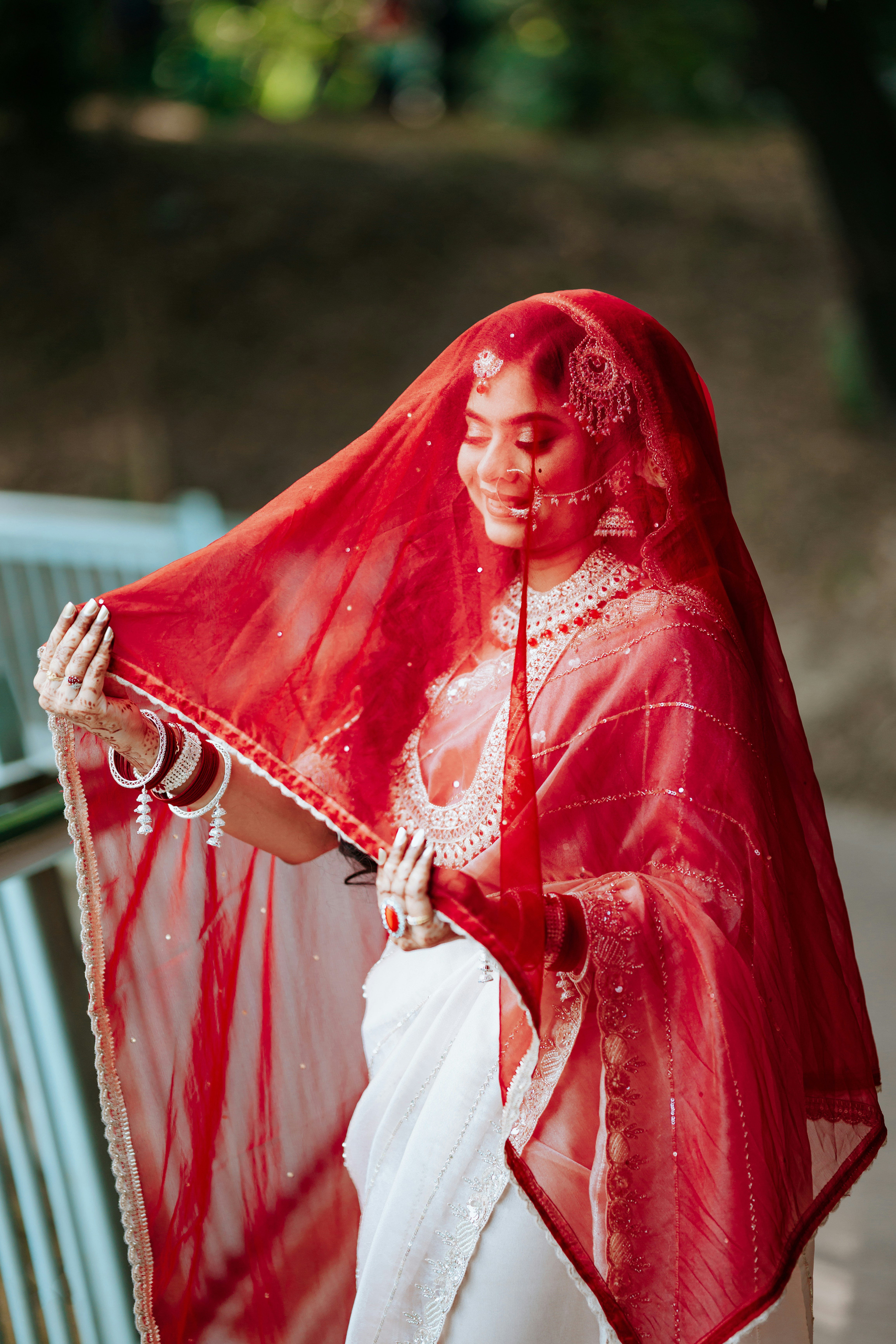 A beautiful woman wears a red veil. photo – Free Wedding Image on Unsplash