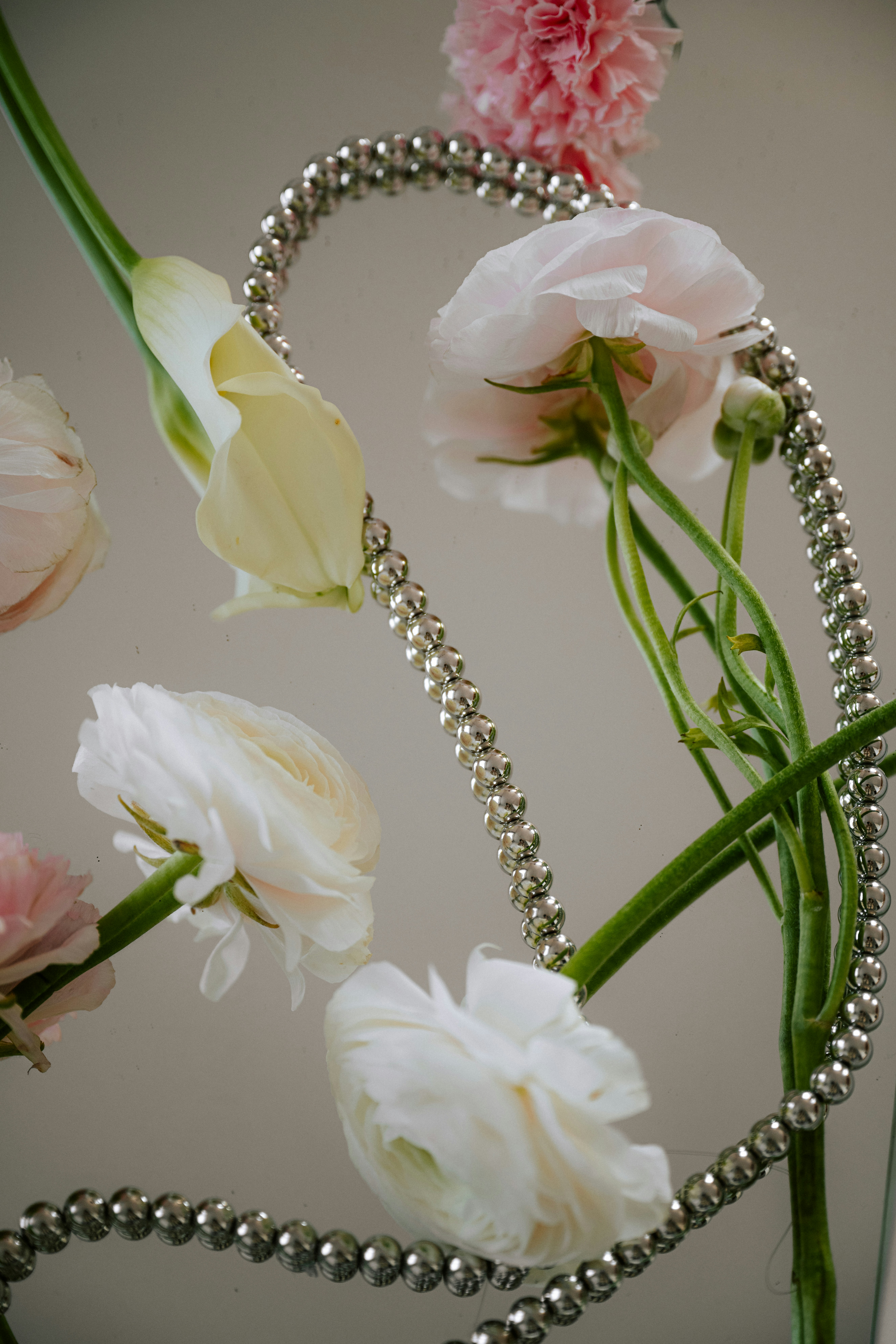 Petals and Pearls: A Reflective Floral Portrait