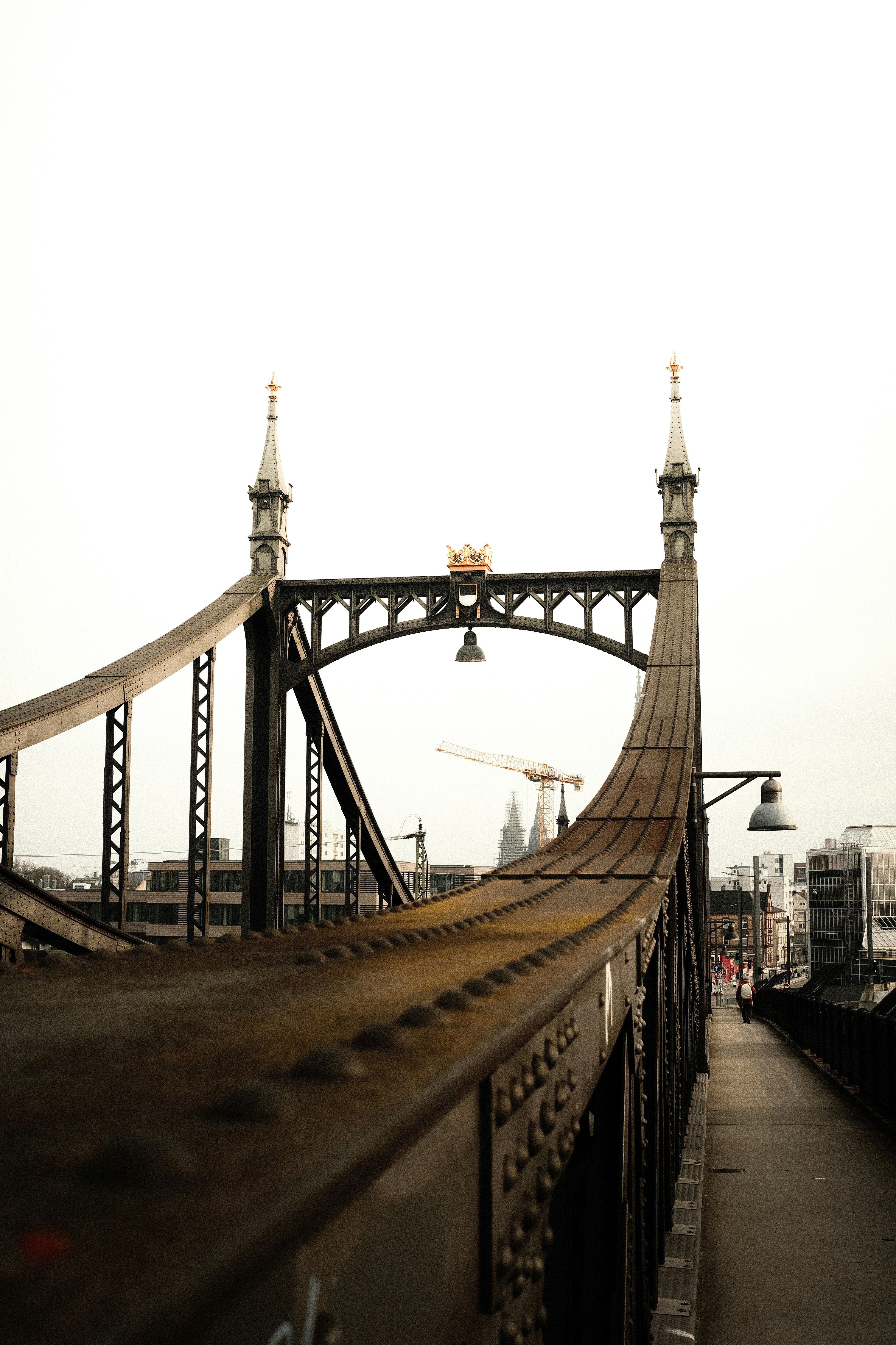 Bridge view with city buildings in the distance. photo – Free Street ...