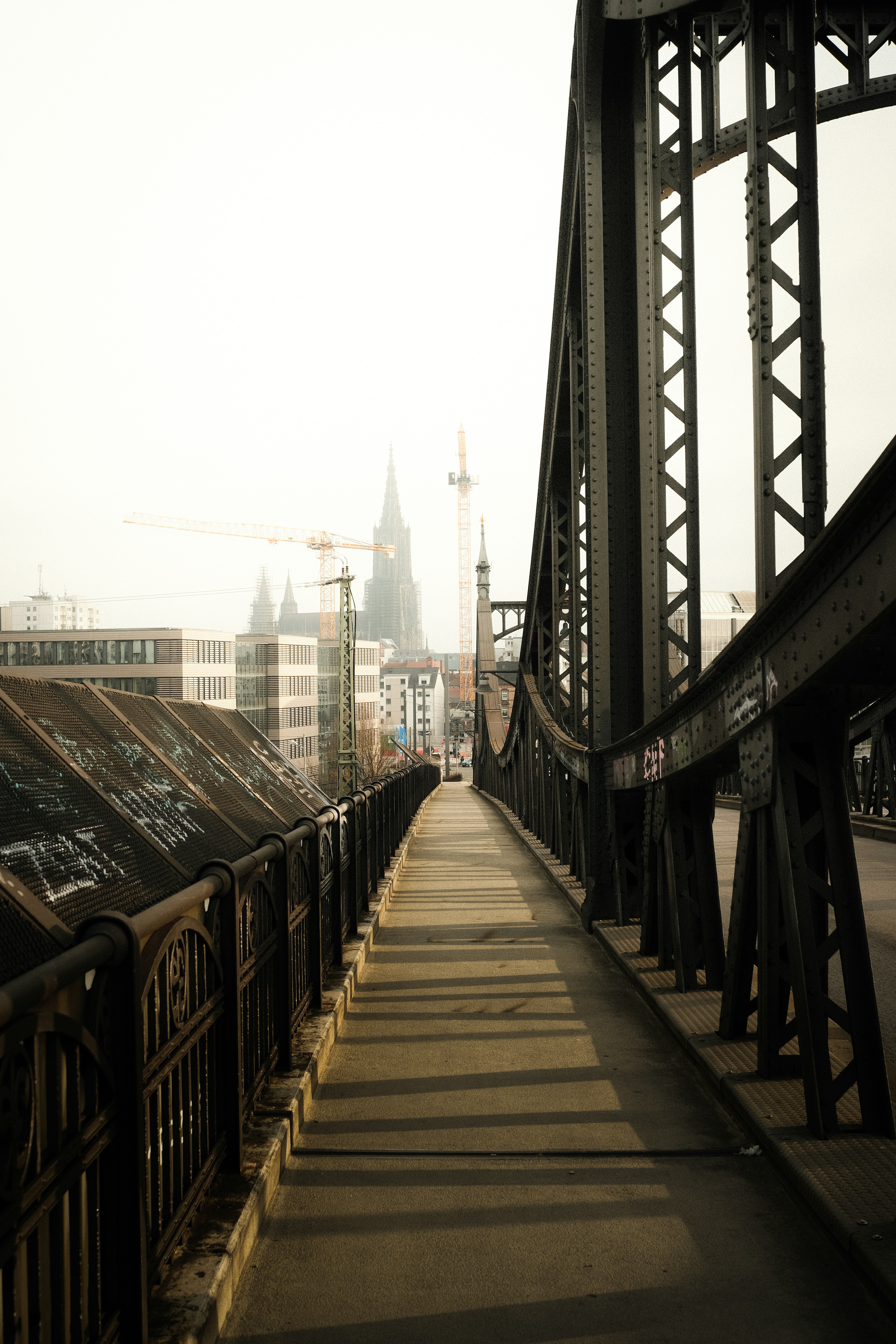 A bridge's perspective of a distant city. photo – Free City Image on ...
