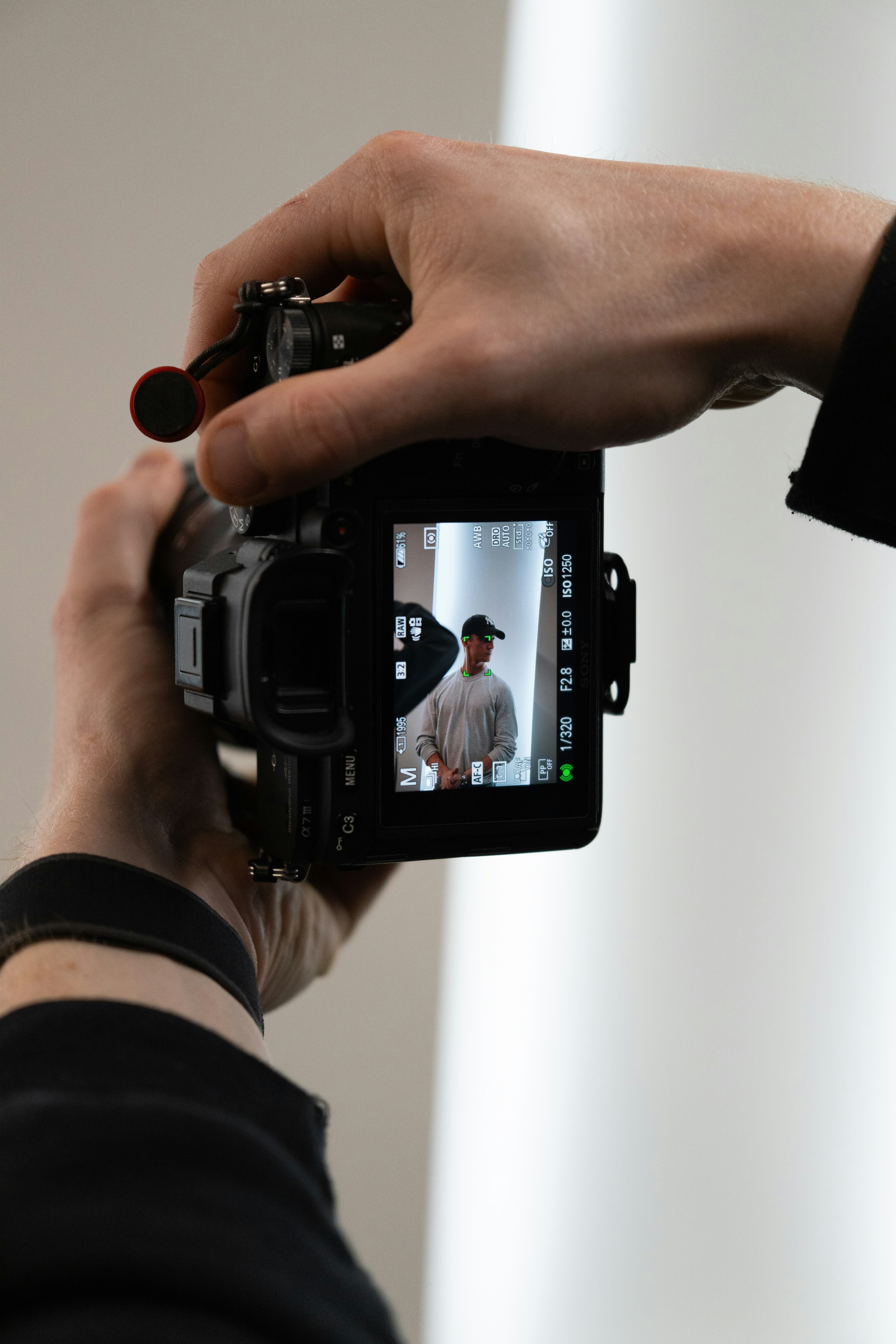 Photographer takes a picture of a subject. photo – Free Man Image on ...