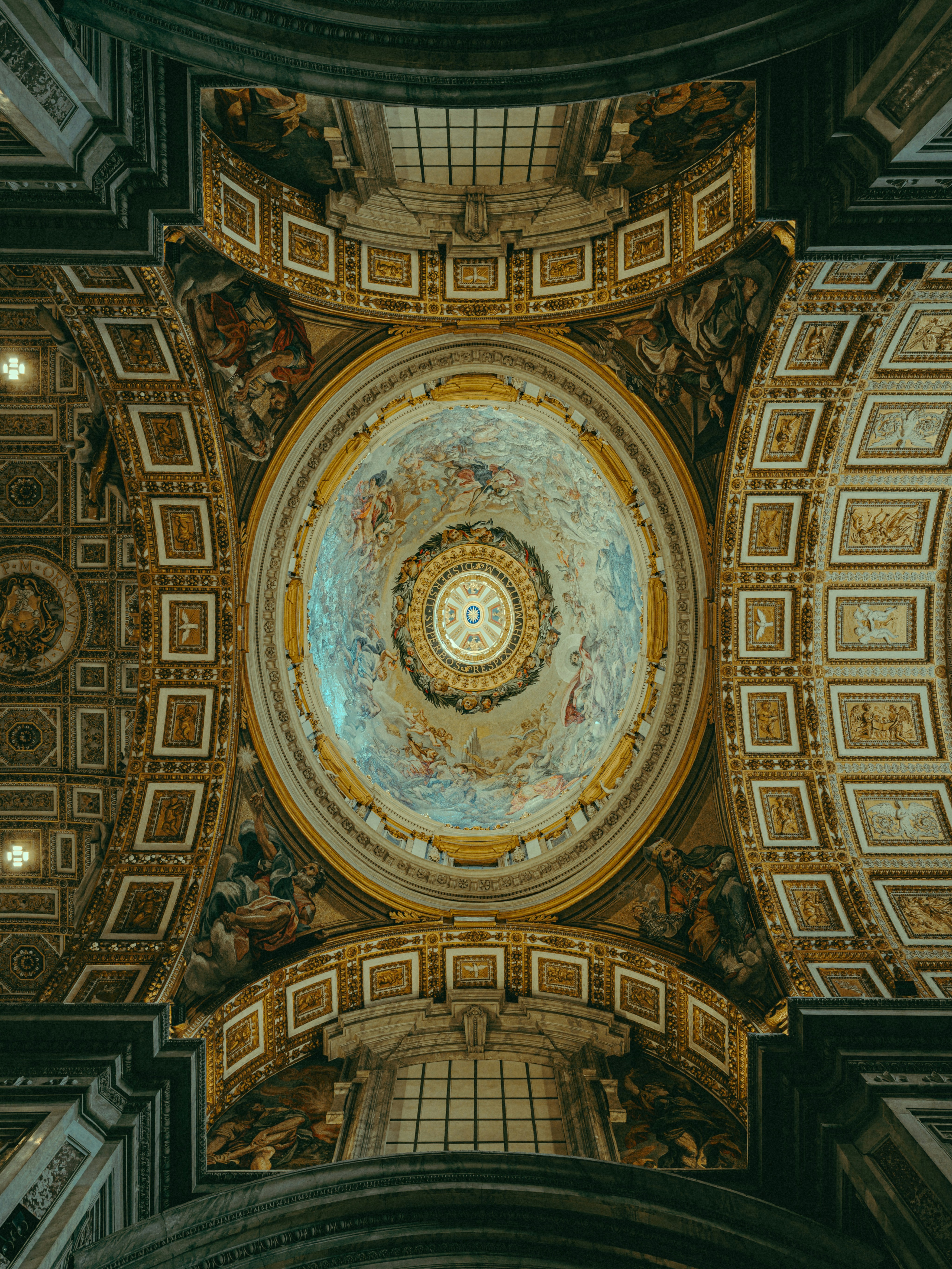 Ornate dome ceiling with detailed frescoes and geometric patterns.