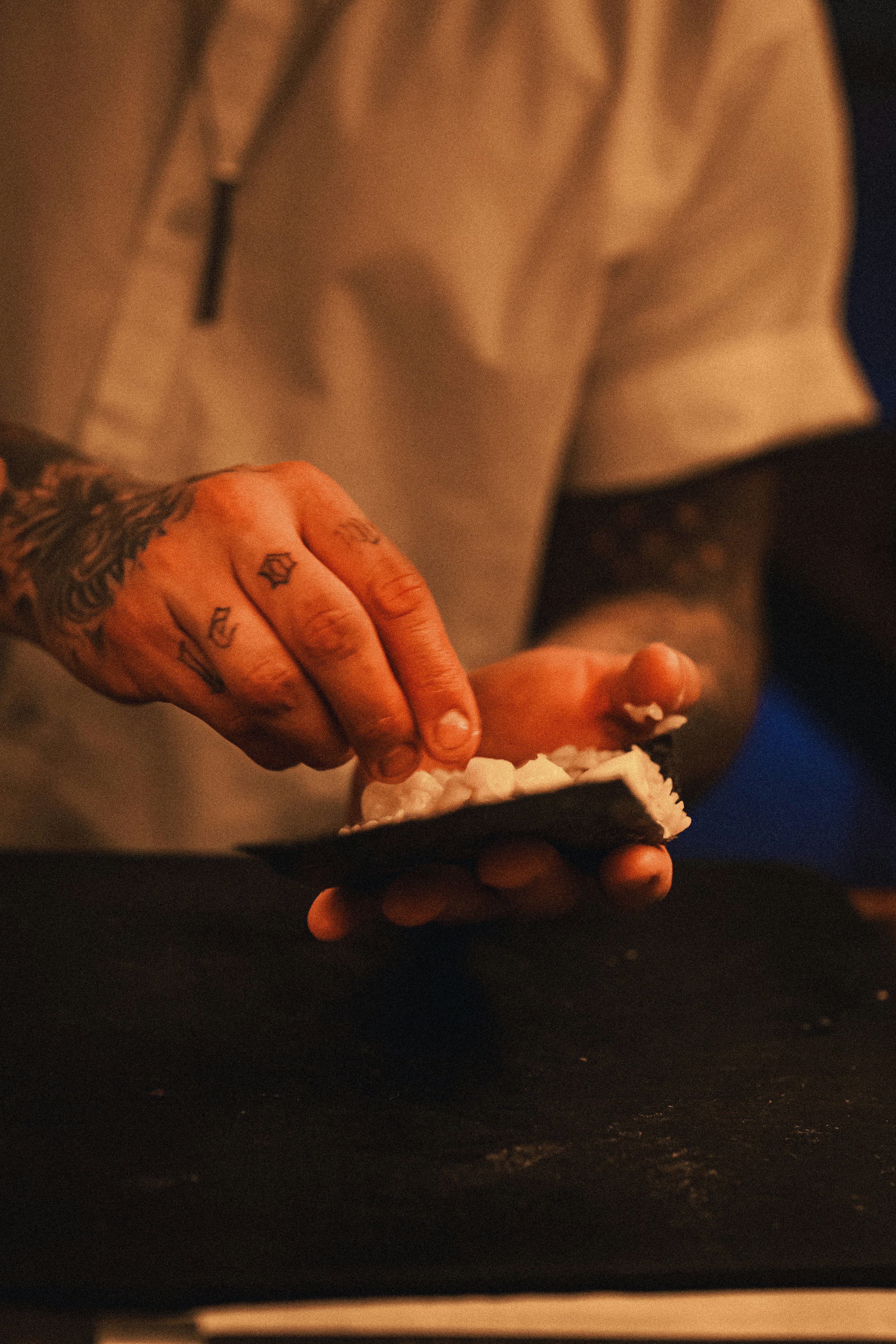 Crafting Culinary Artistry: The Precision of Sushi Preparation