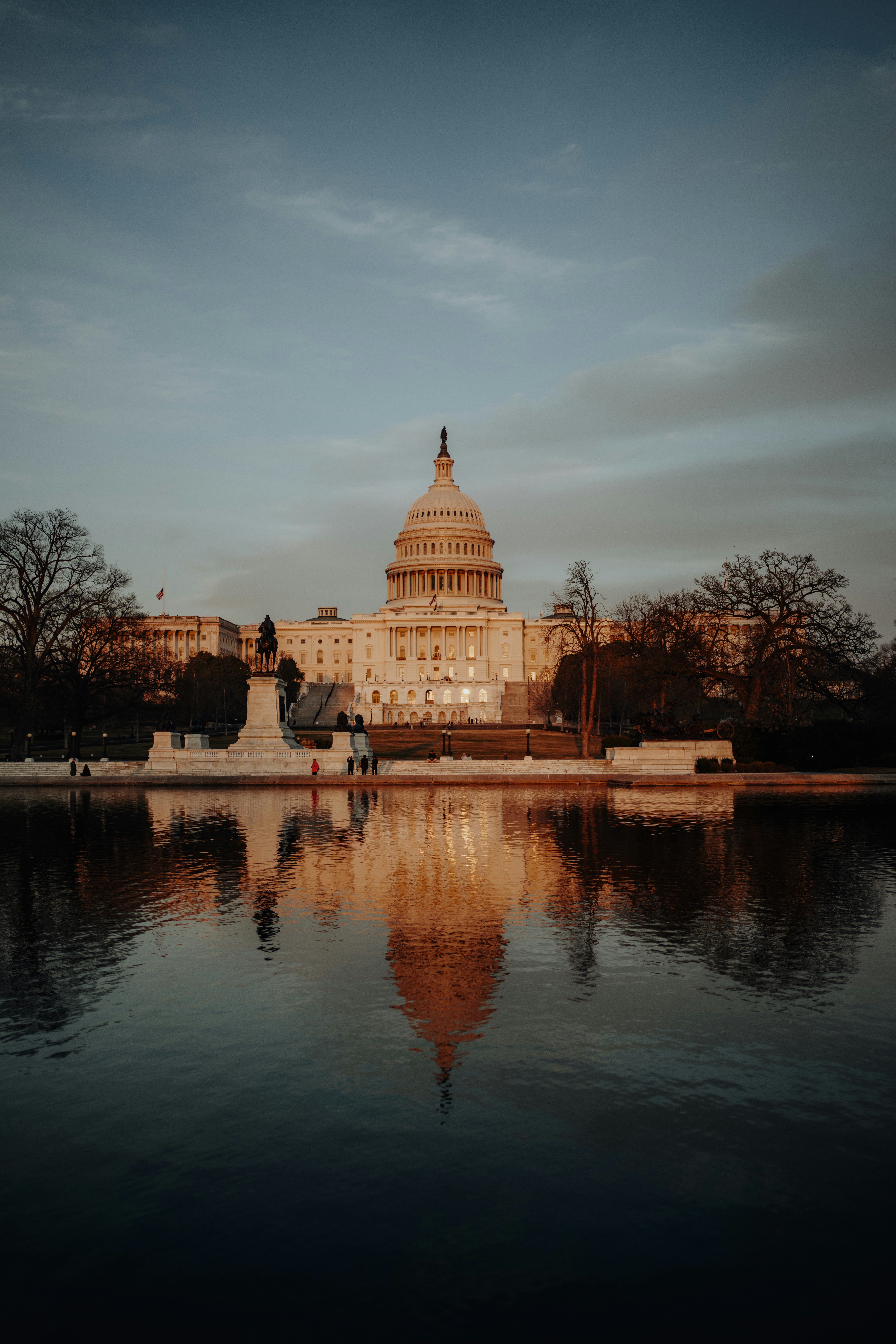 Capitol Reflections at Dusk: A Quiet Moment by the Reflecting Pool