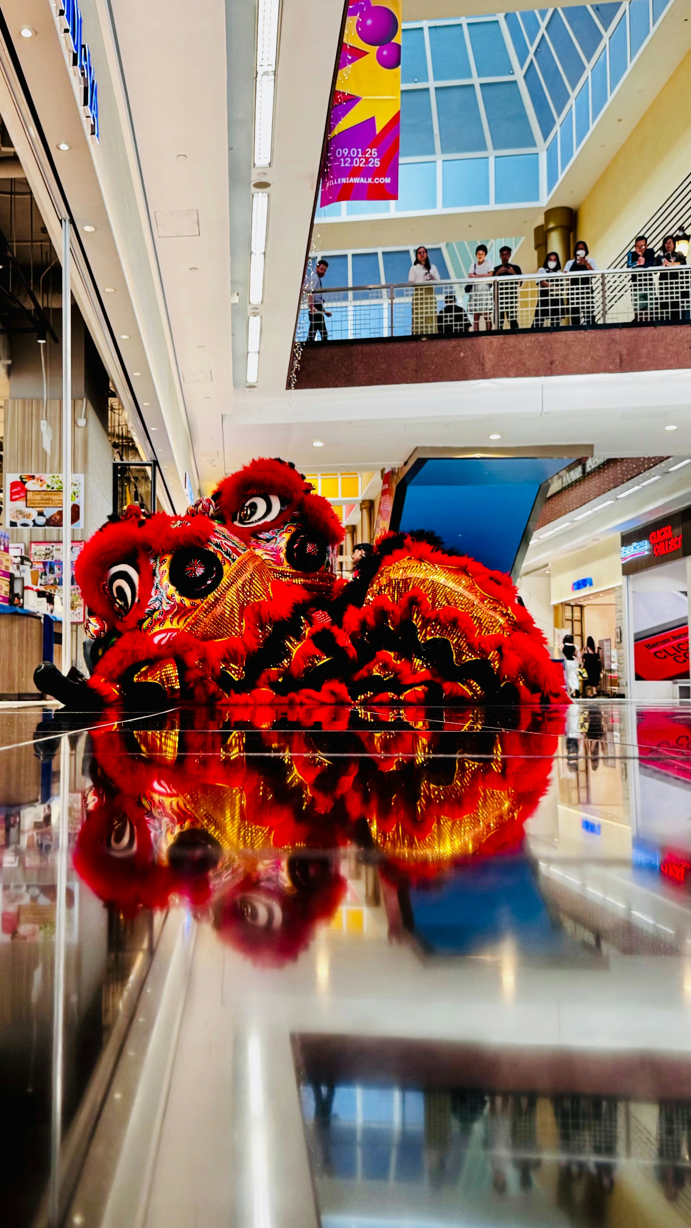 Red Lion Dance in a Shimmering Mall Atrium
