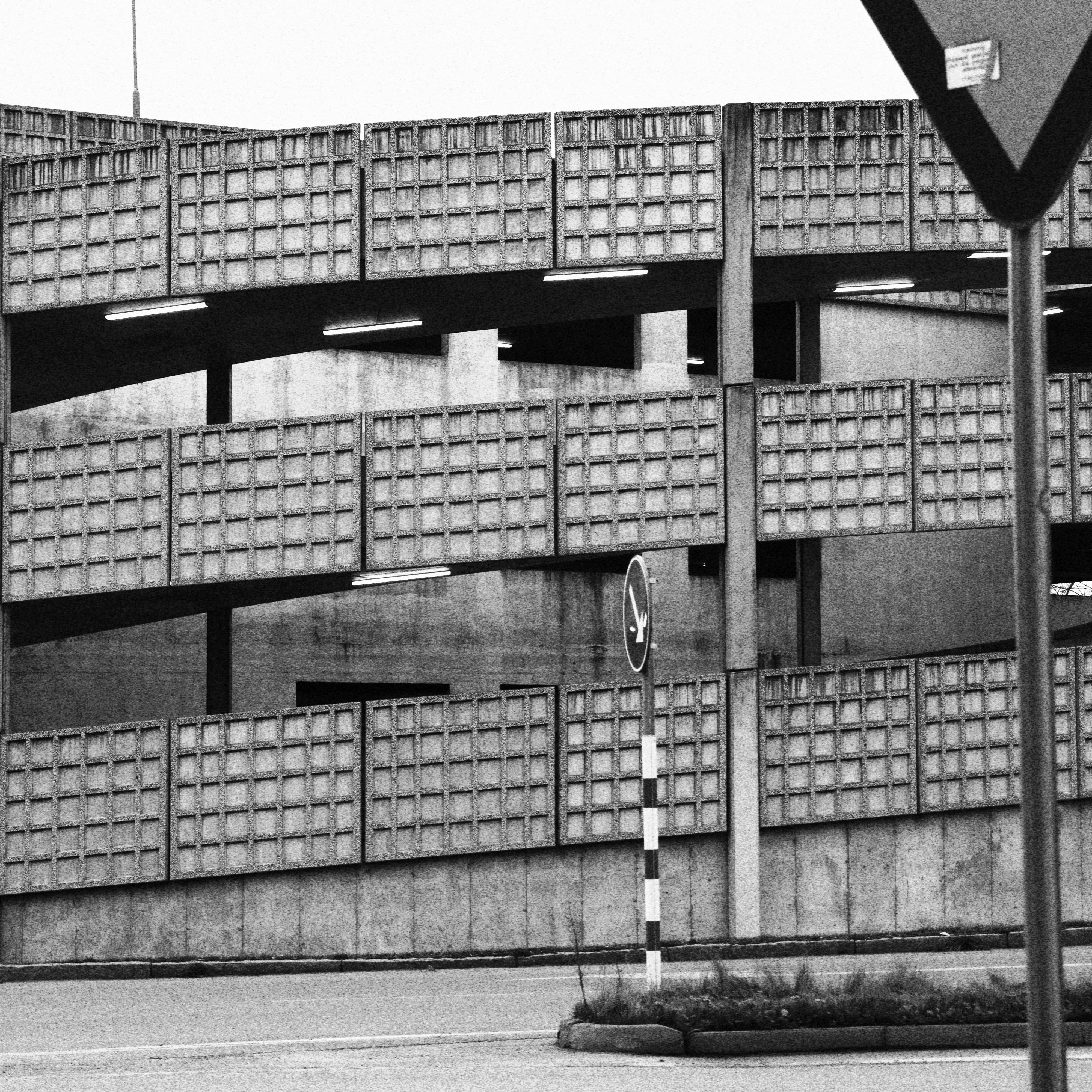 Monochrome Gridscape: The Signpost in the Urban Maze
