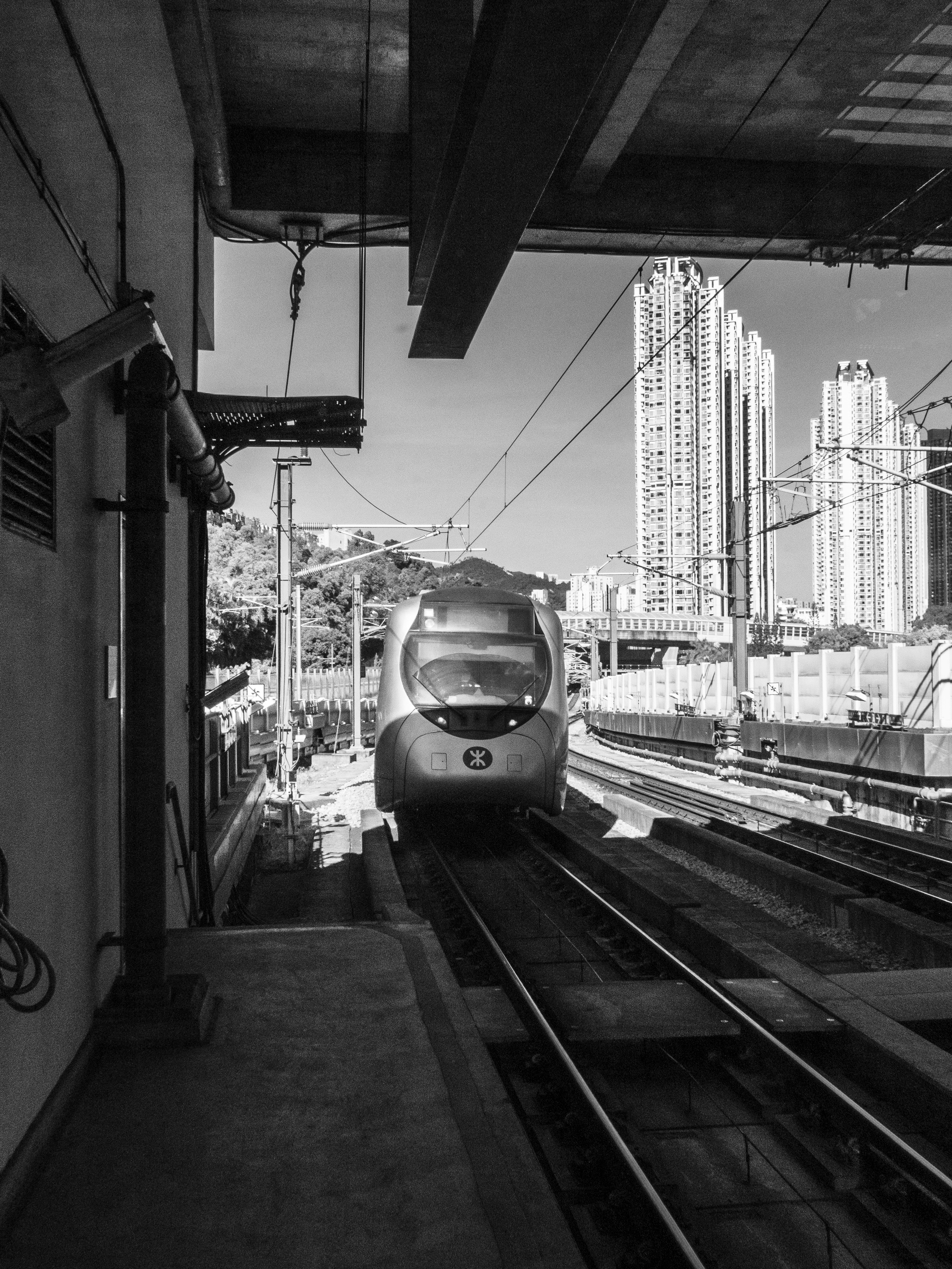 Underground Steel Serpent: A Mono Commuter Train at Sunset