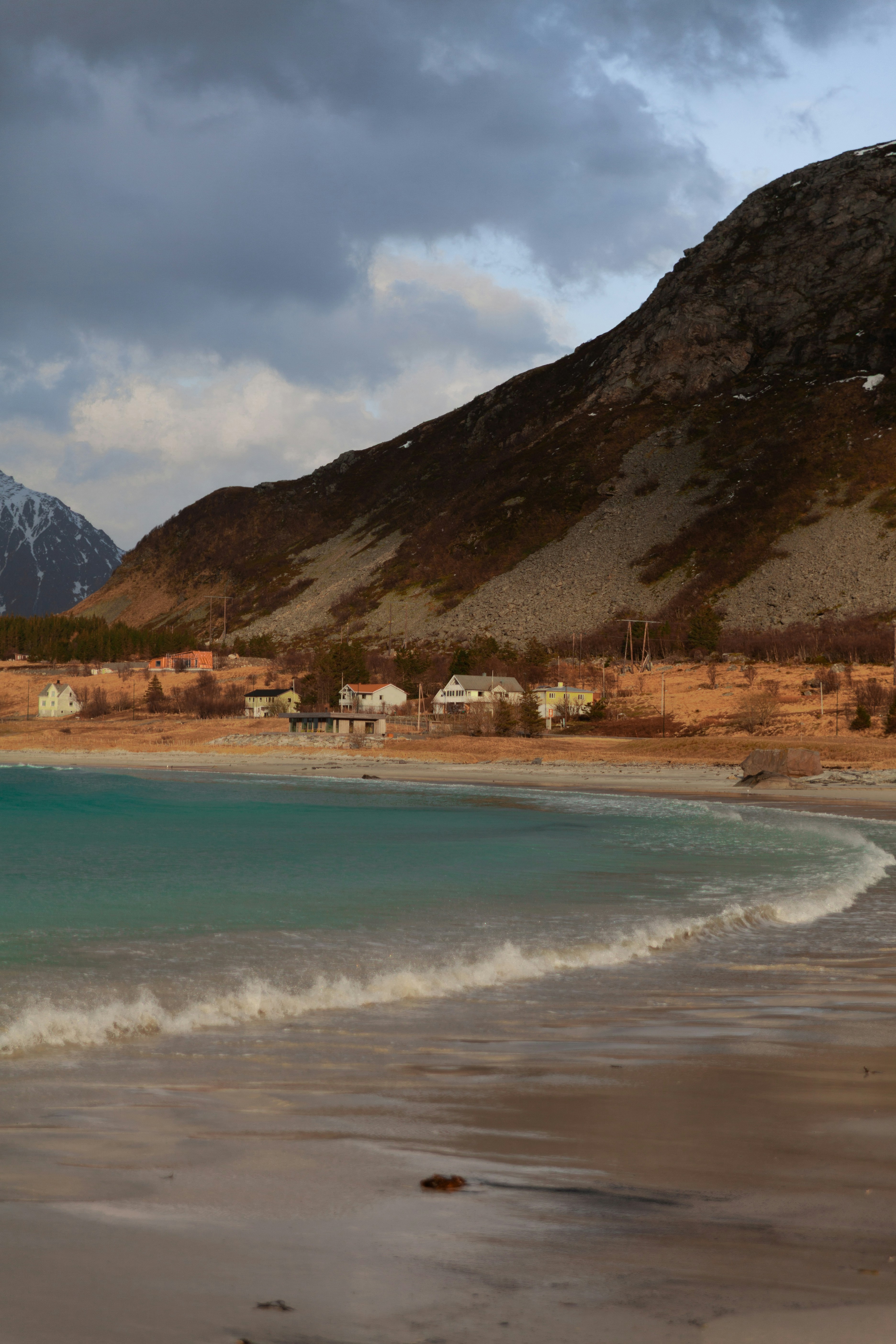 Harbor Ridge: A Coastal Village Nestled at the Base of a Weathered Mountain