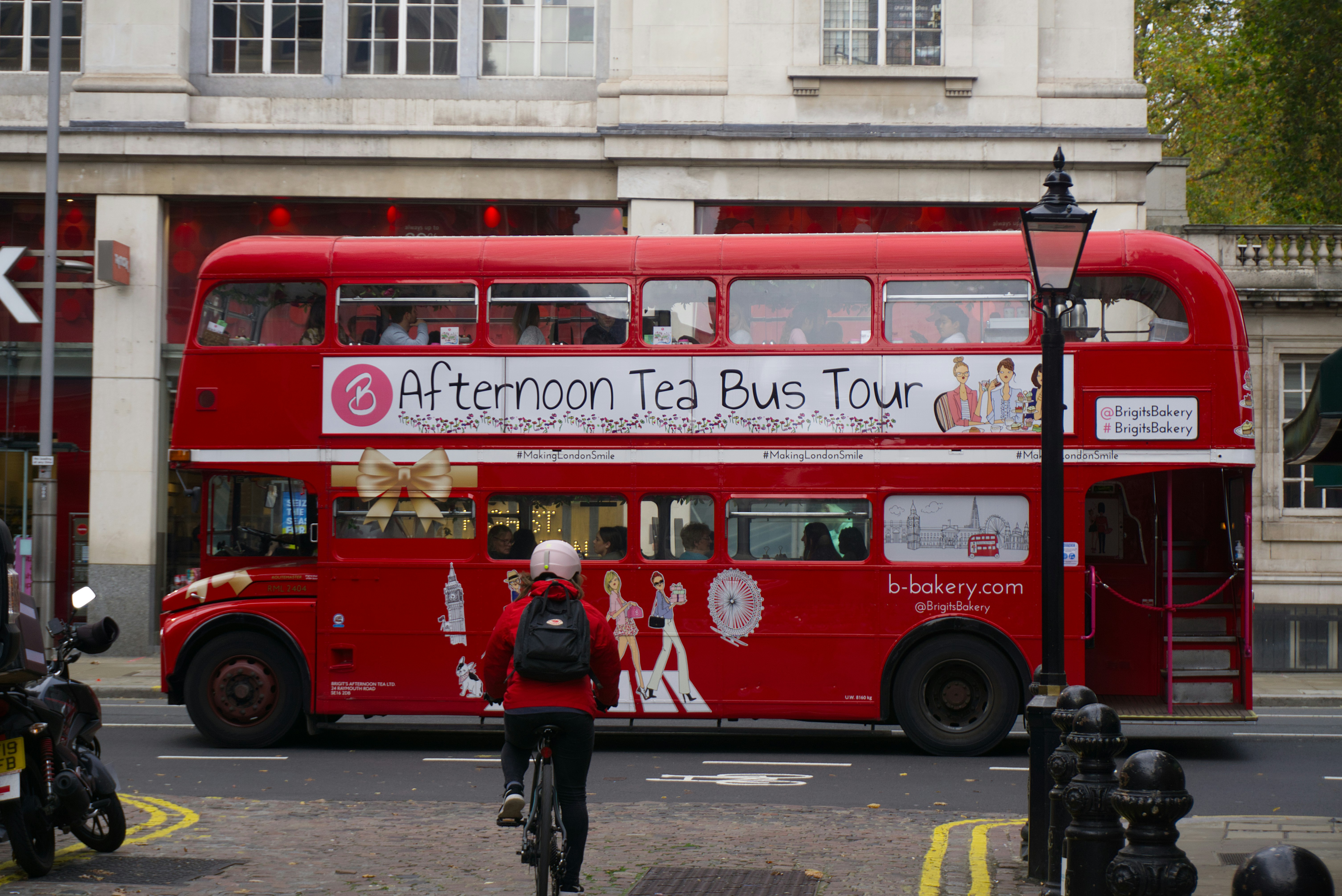 Red Double-Decker Bus Spotlight: Afternoon Tour Advertising