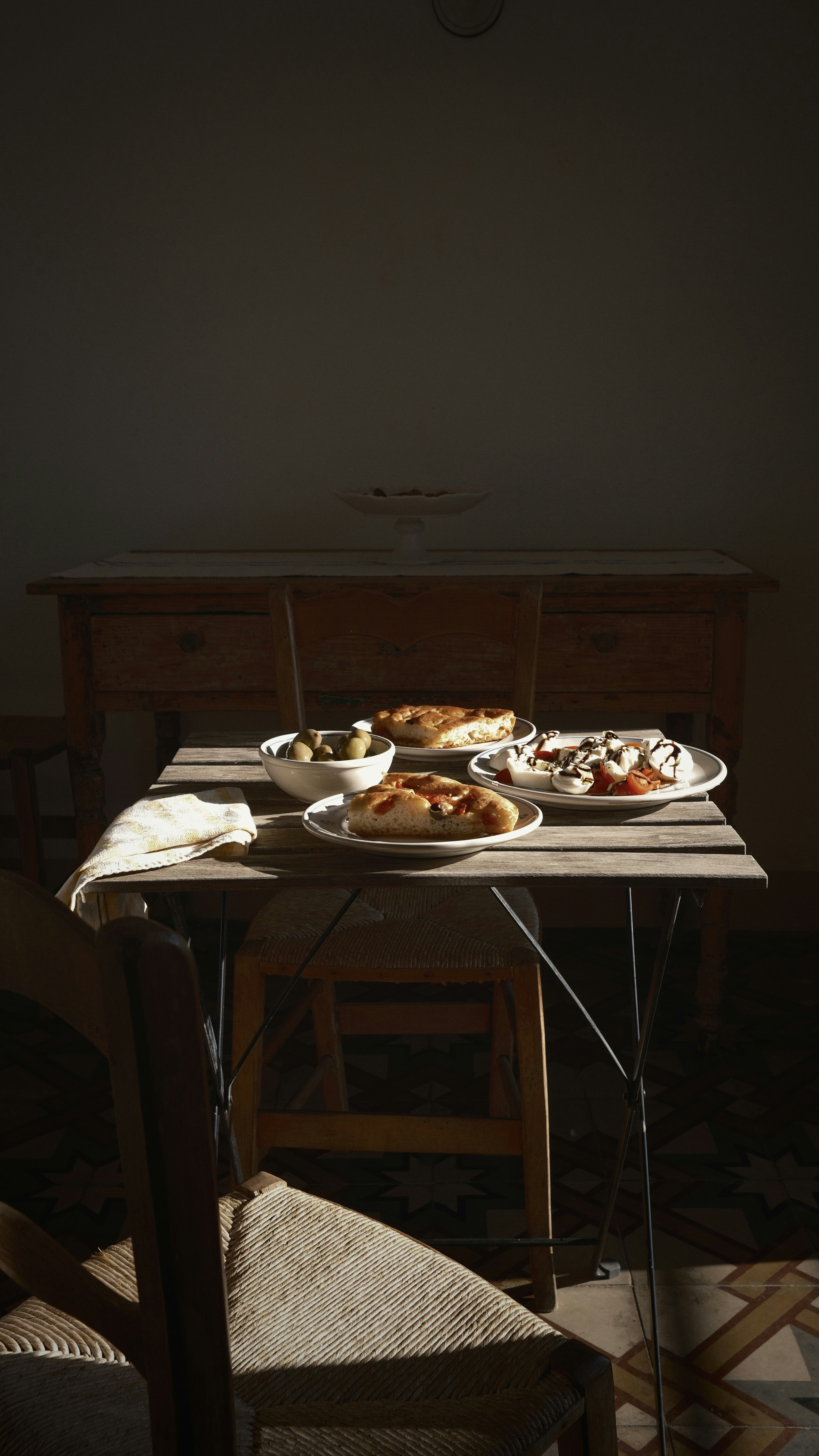 A table with food is set for a meal.