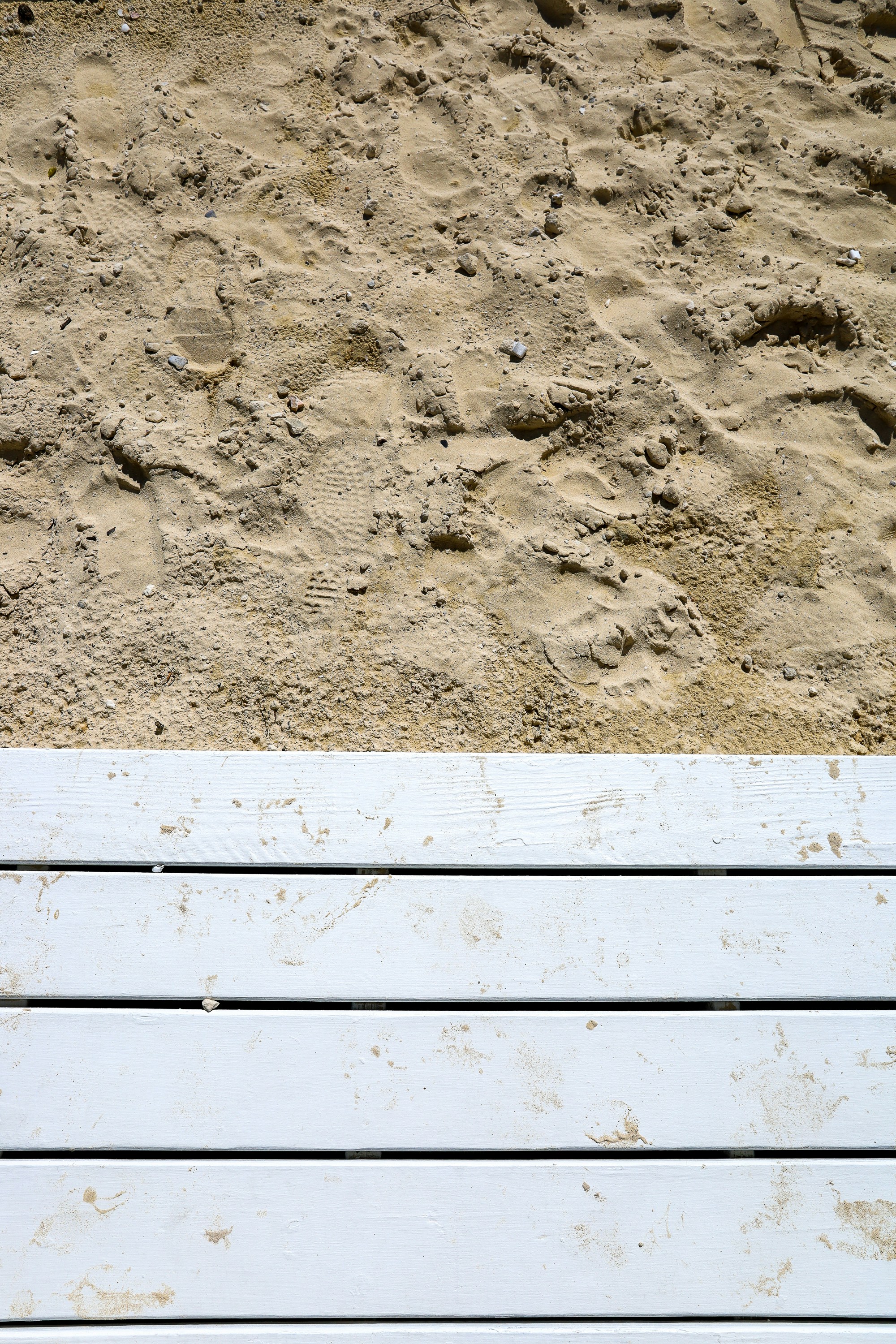 Sand and Planks: A Quiet Coastal Boardwalk in Warm Light