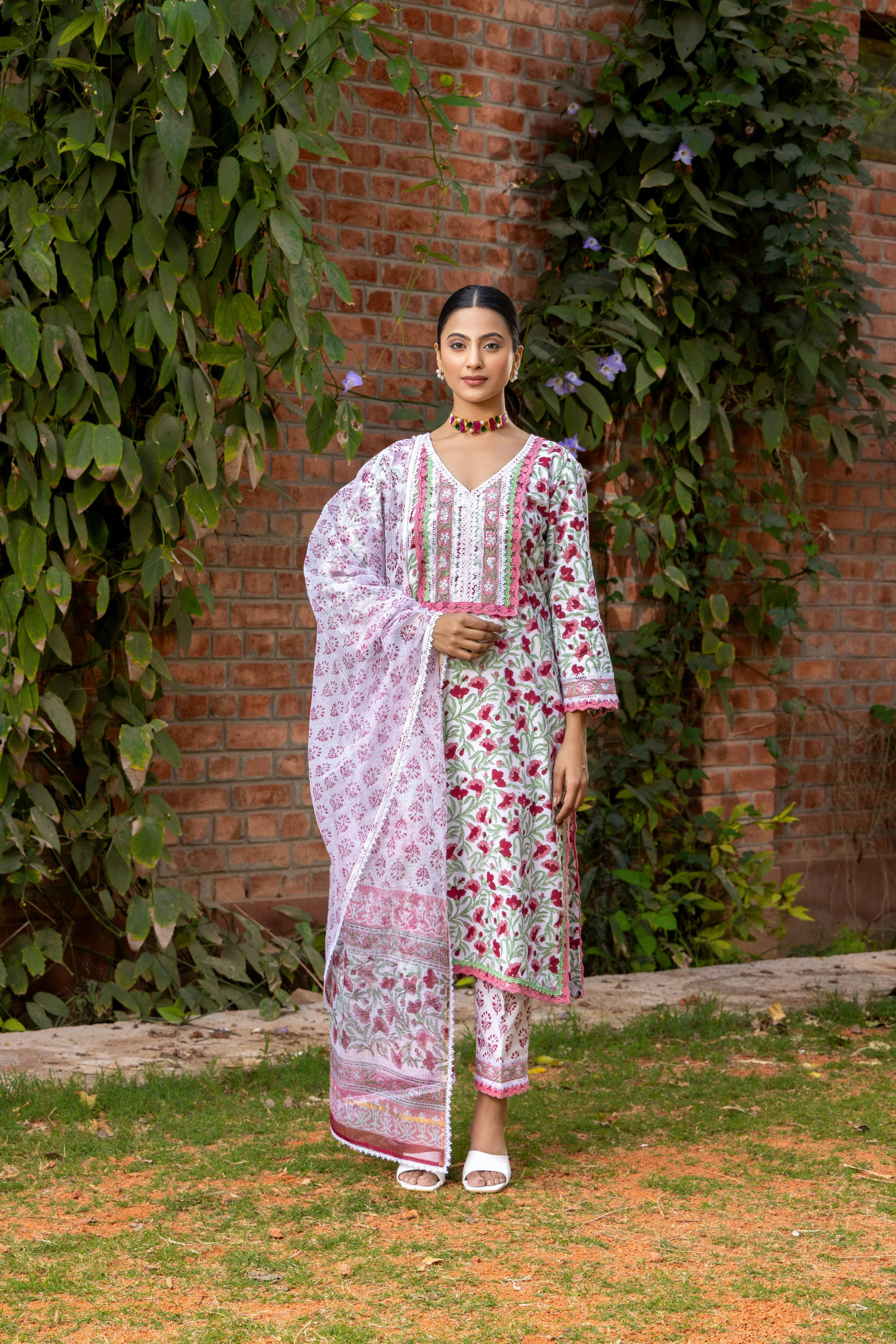 Woman models a floral indian suit with a dupatta. photo – Free Fashion ...
