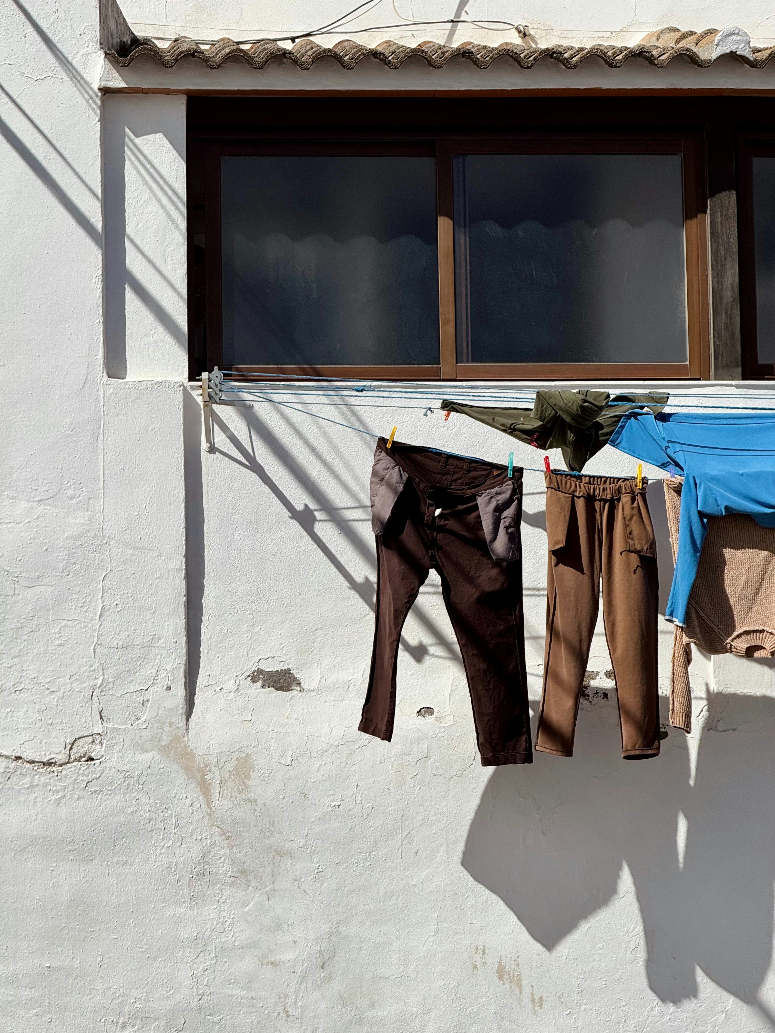Sunlit Laundry on a White Wall: Everyday Colors in Shadow and Light