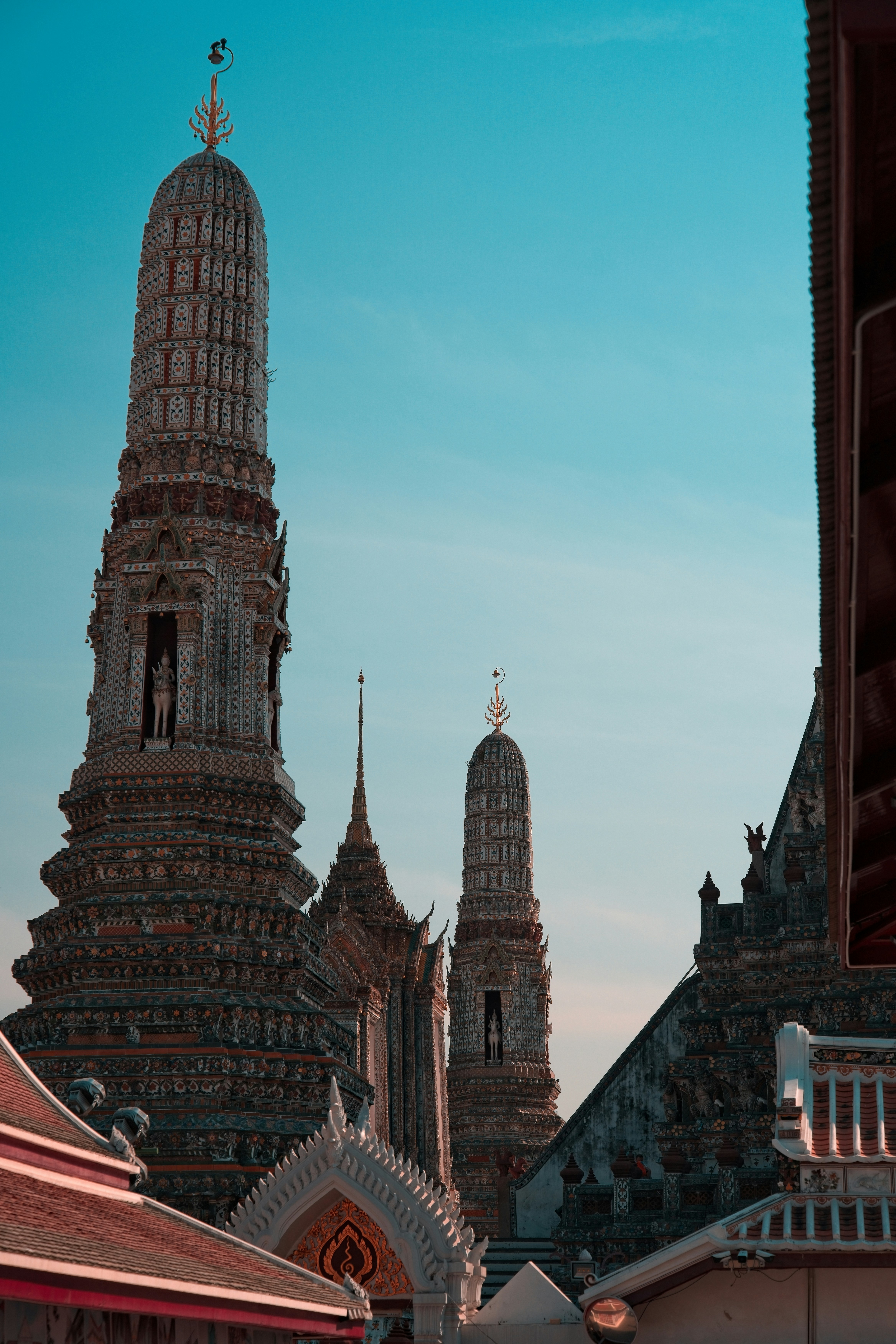 Beautiful thai temple towers stand tall against the sky. photo – Free ...