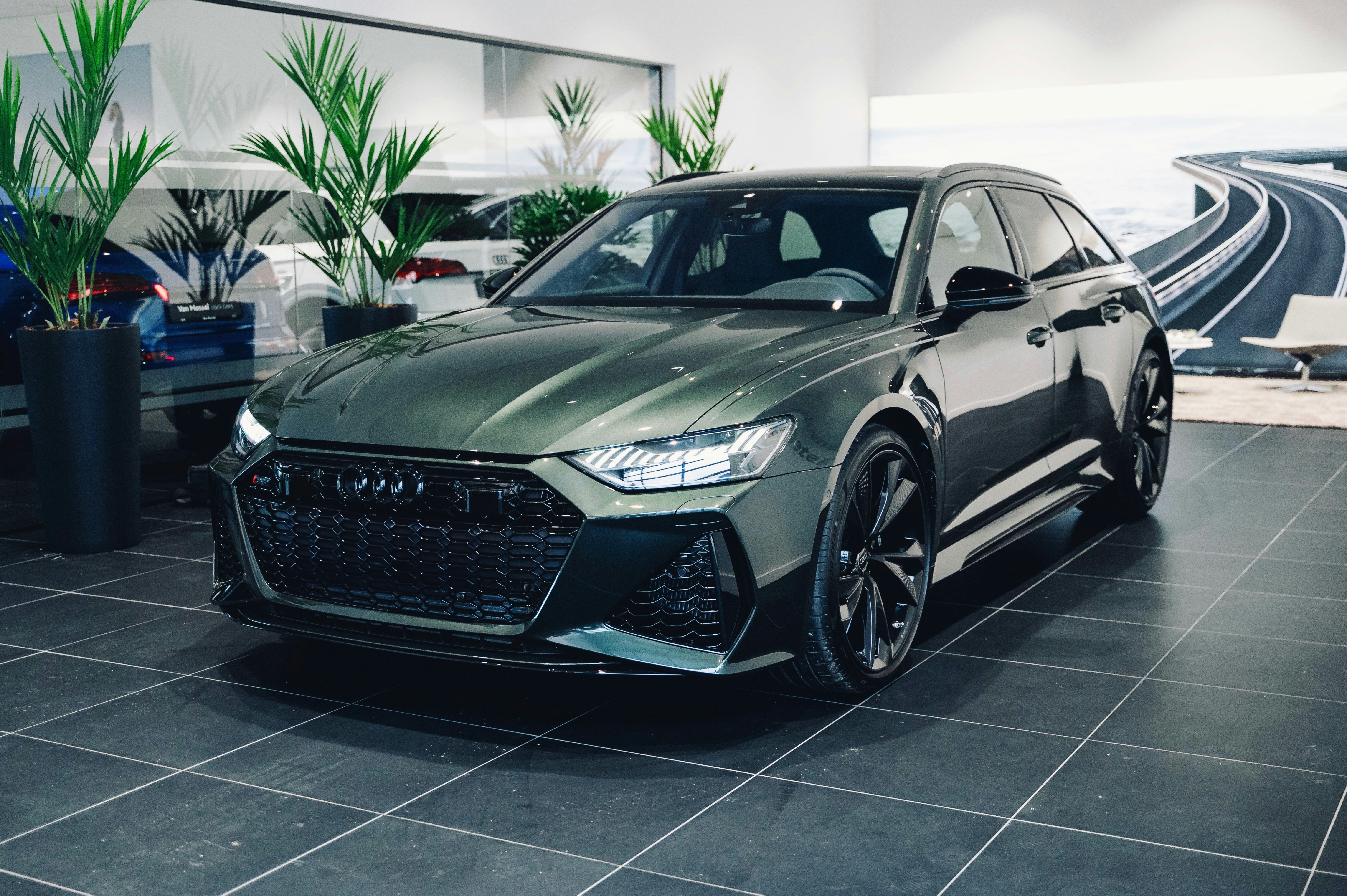 A dark green audi rs6 avant is on display. photo – Free Car Image on ...