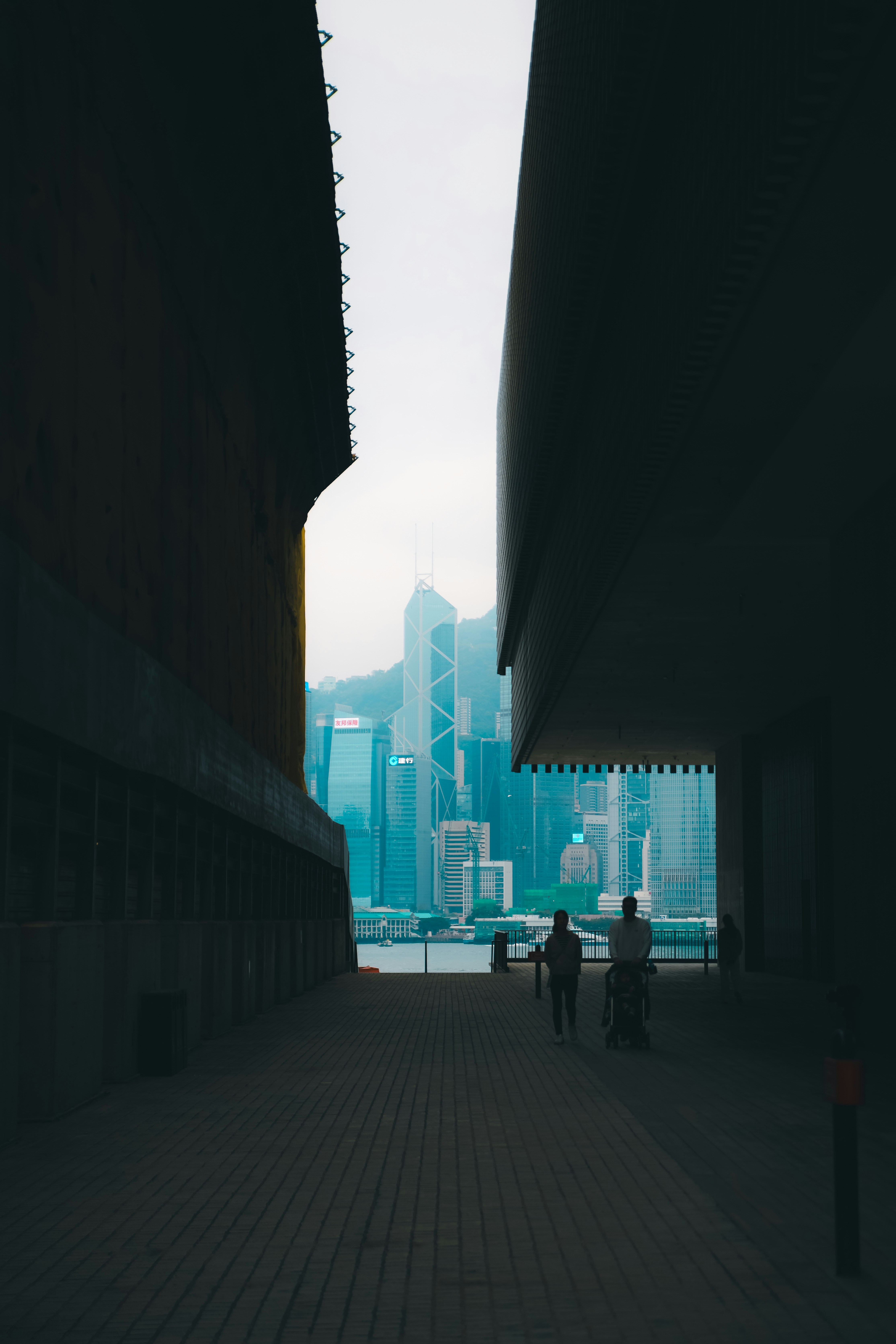 People walk towards the city skyline in hong kong. photo – Free ...