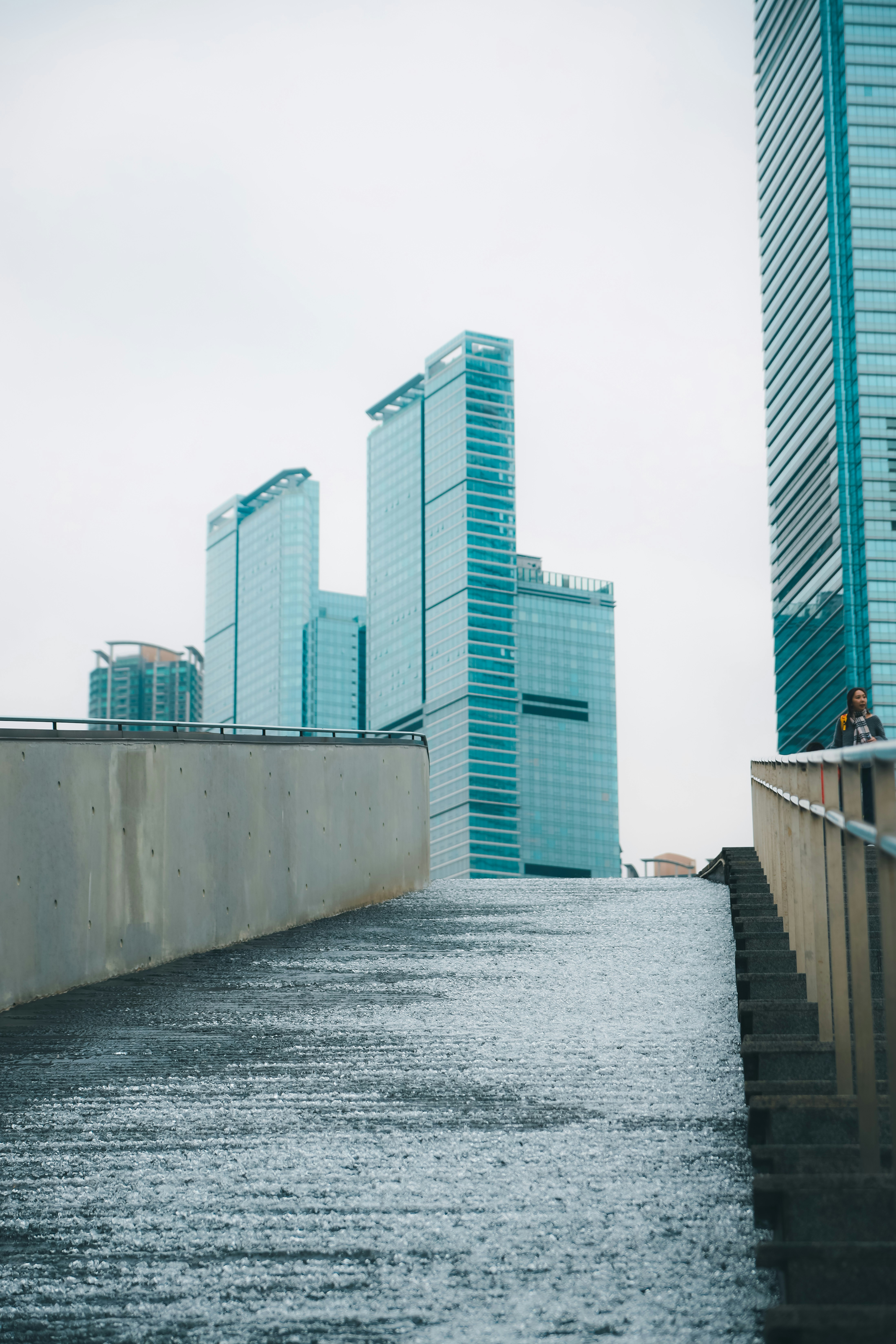 Modern city buildings stand tall on a cloudy day. photo – Free Human ...