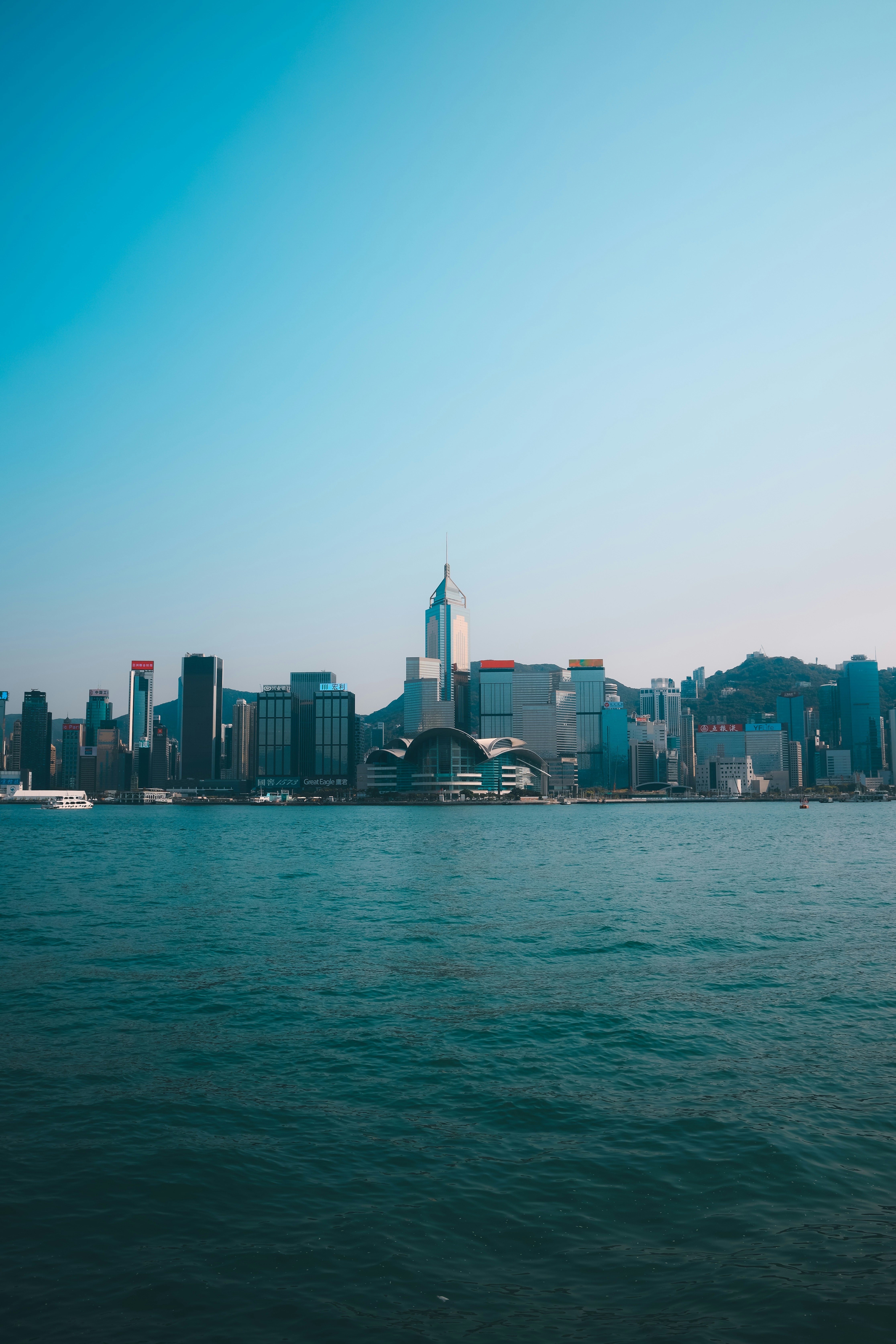 Hong kong's beautiful skyline sits across the water. photo – Free City ...