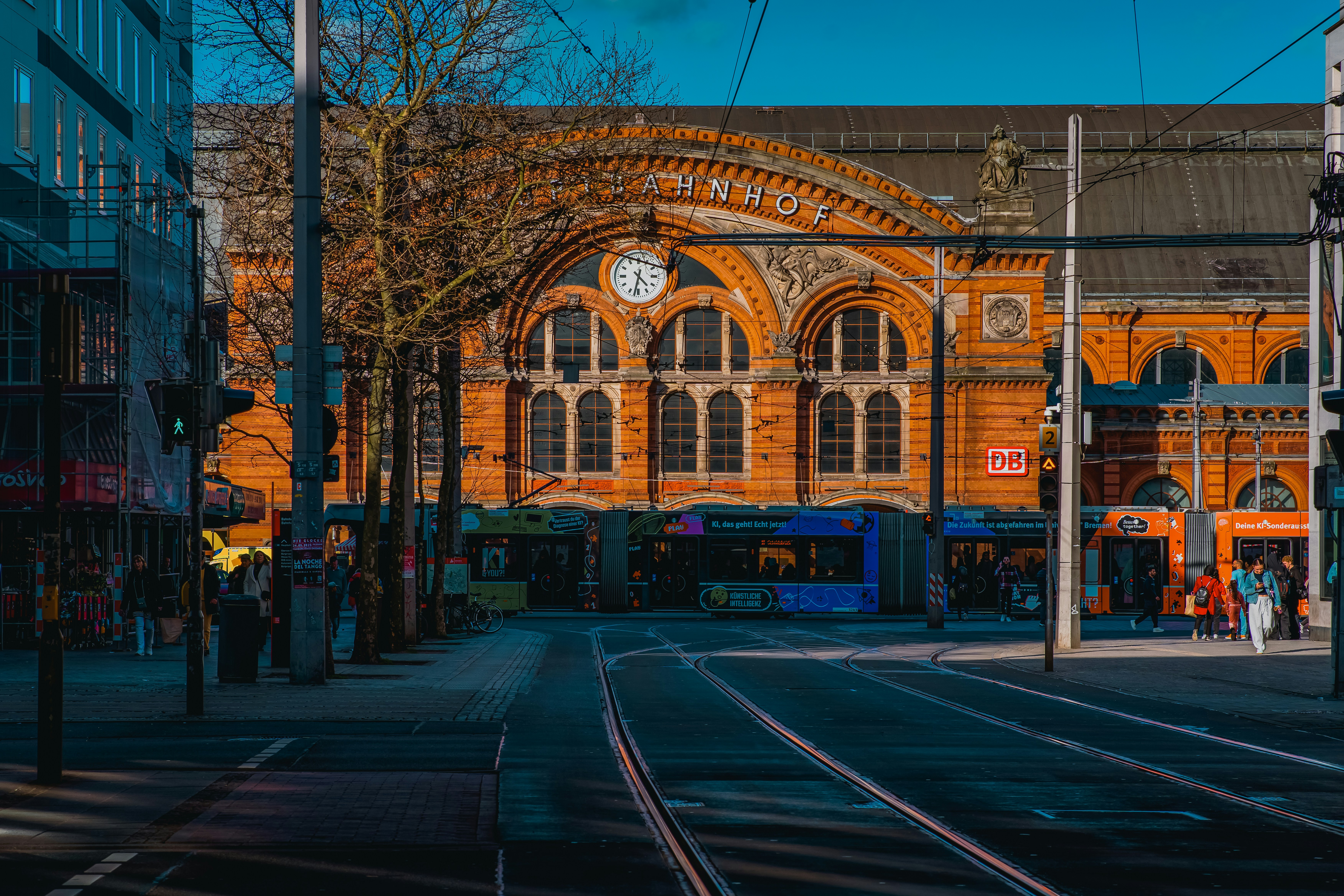 A street view of a historic train station. photo – Free Wallpaper Image ...