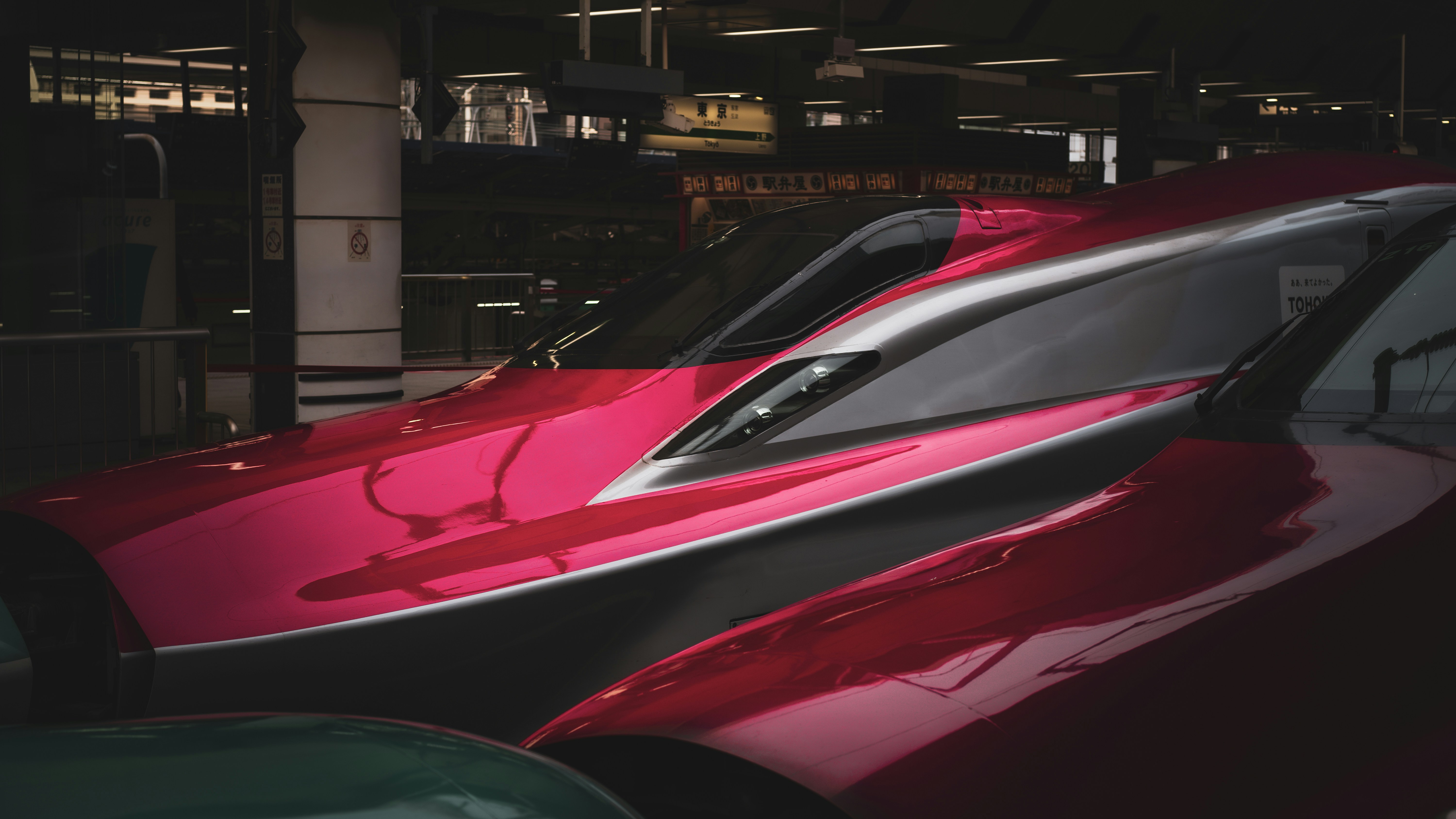Modern train cars are shown in a station. photo – Free Japan Image on ...