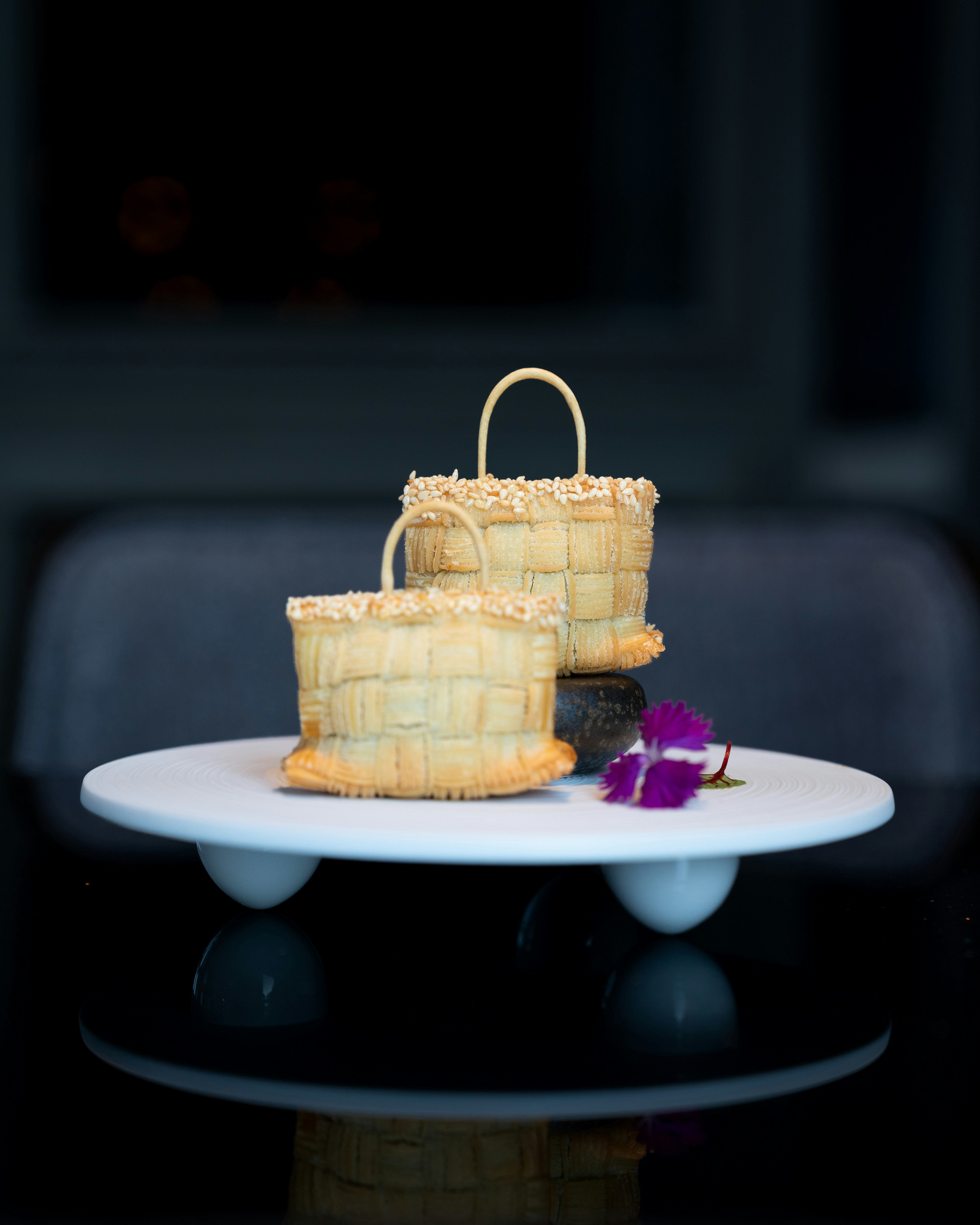 Basket-Weave Pastry Towers on a White Pedestal Plate