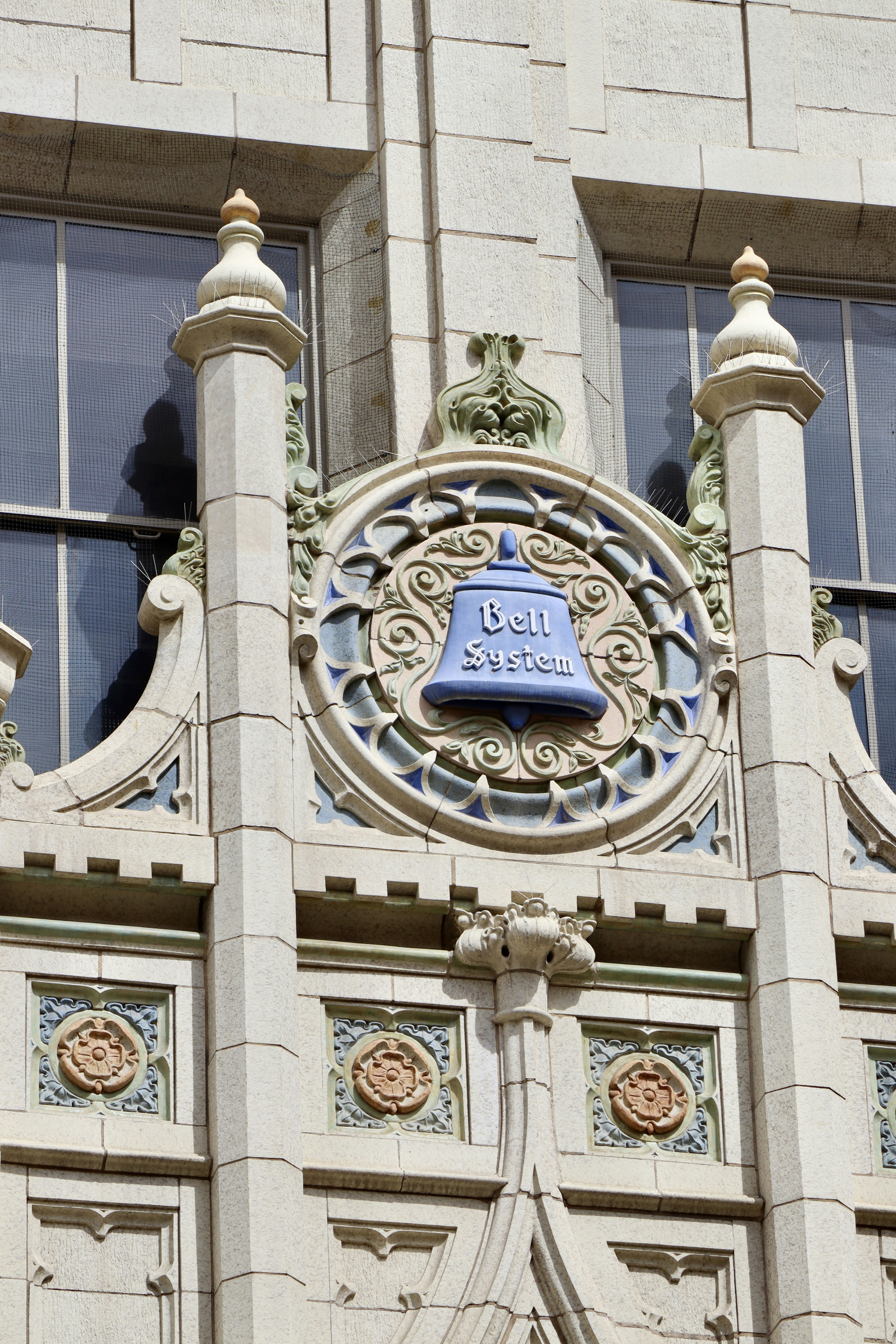 A building displays the bell system logo. photo – Free Building Image ...