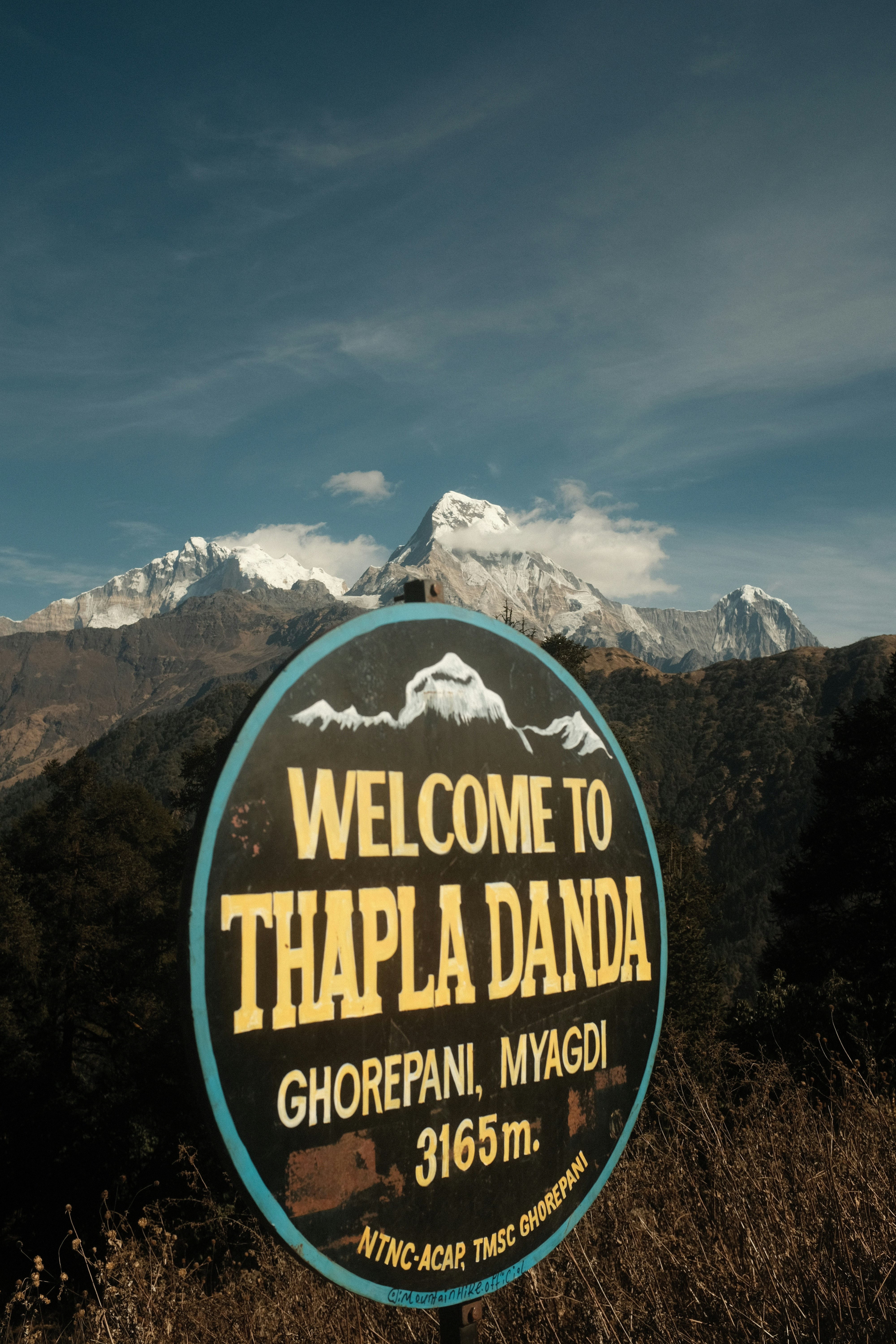 Welcome sign greets hikers with mountains in the background. photo ...