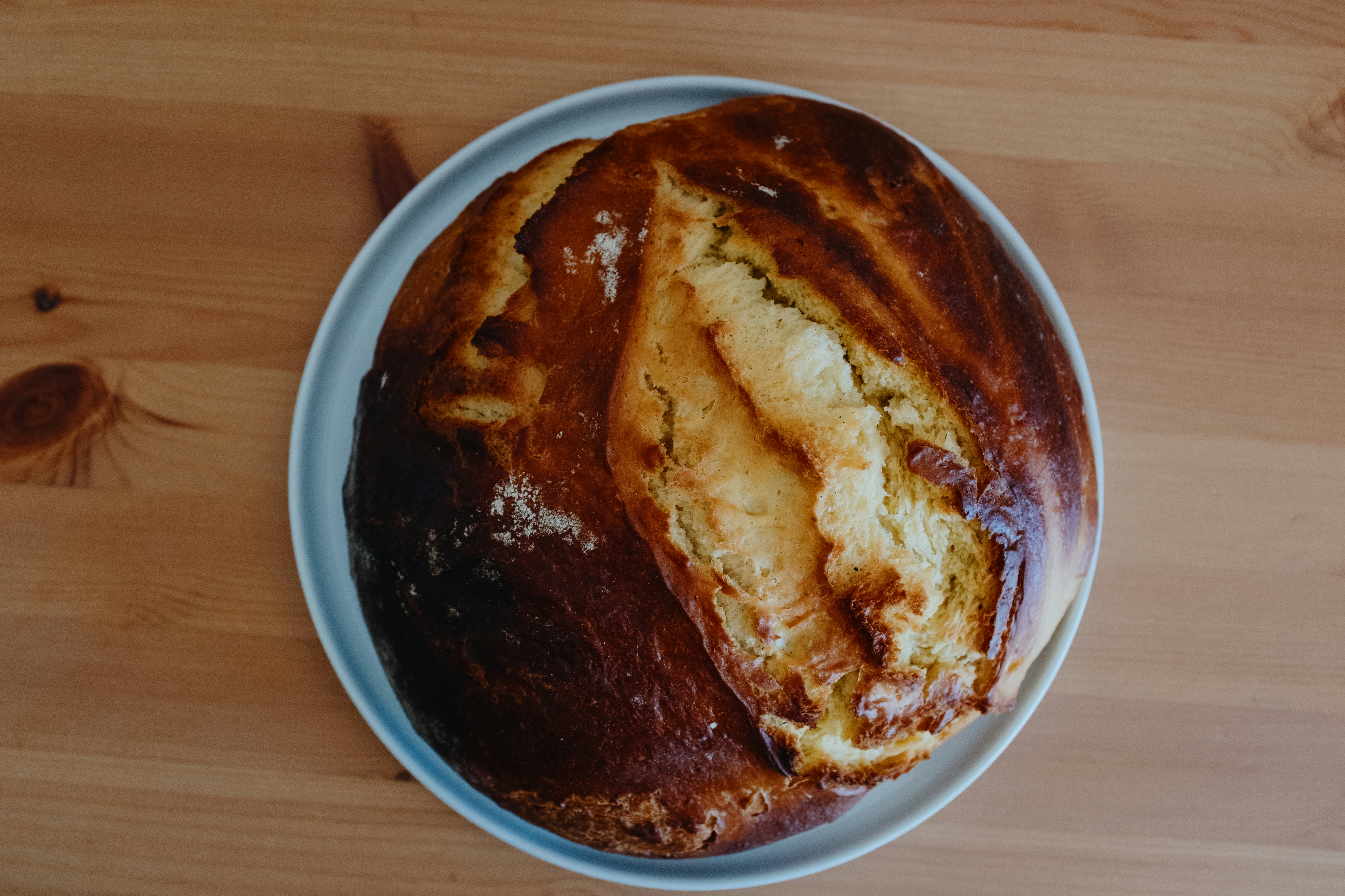 Delicious, golden-brown bread on a plate.