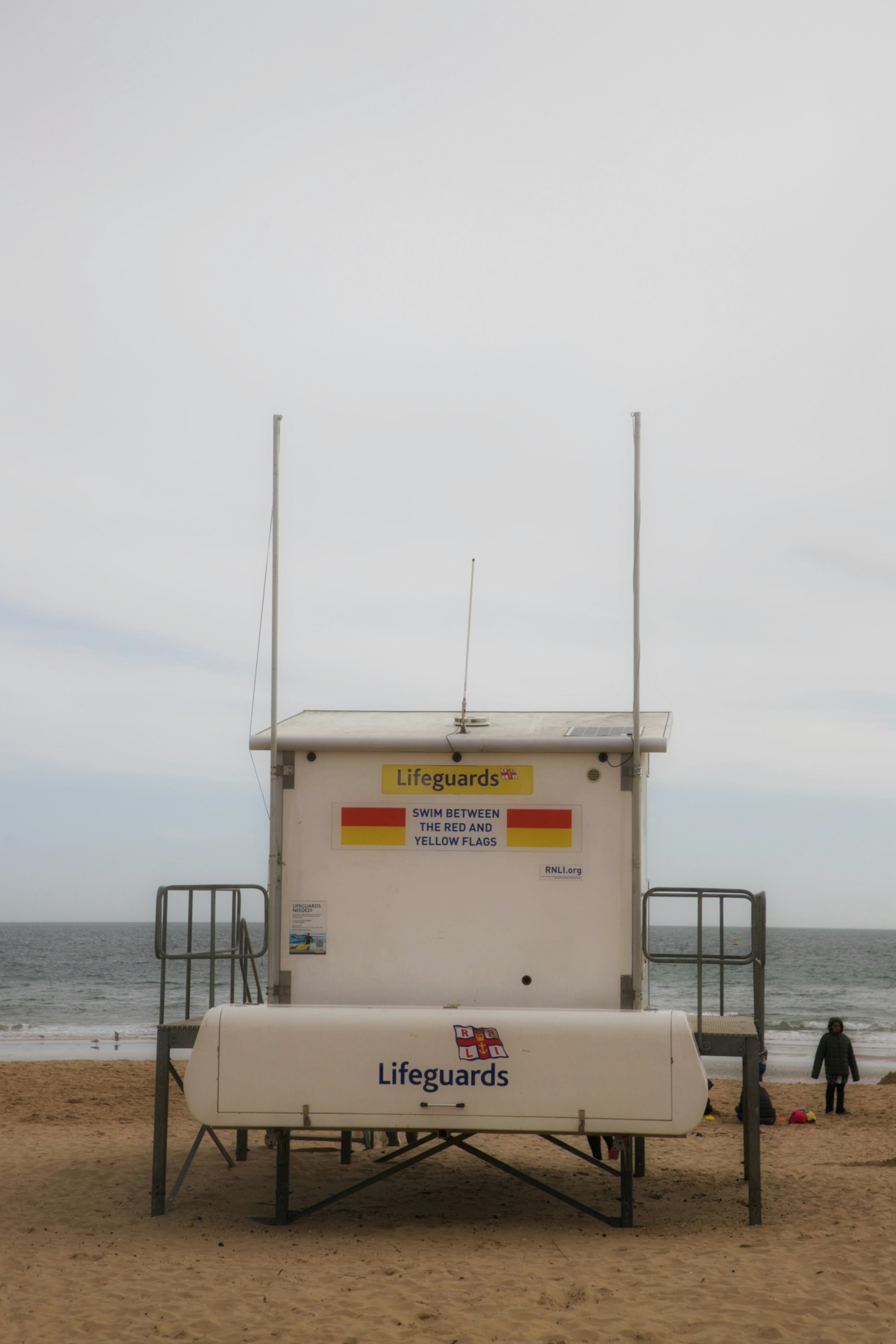 Seaside Sentinel: Lifeguard Tower at the Quiet Beach Edge