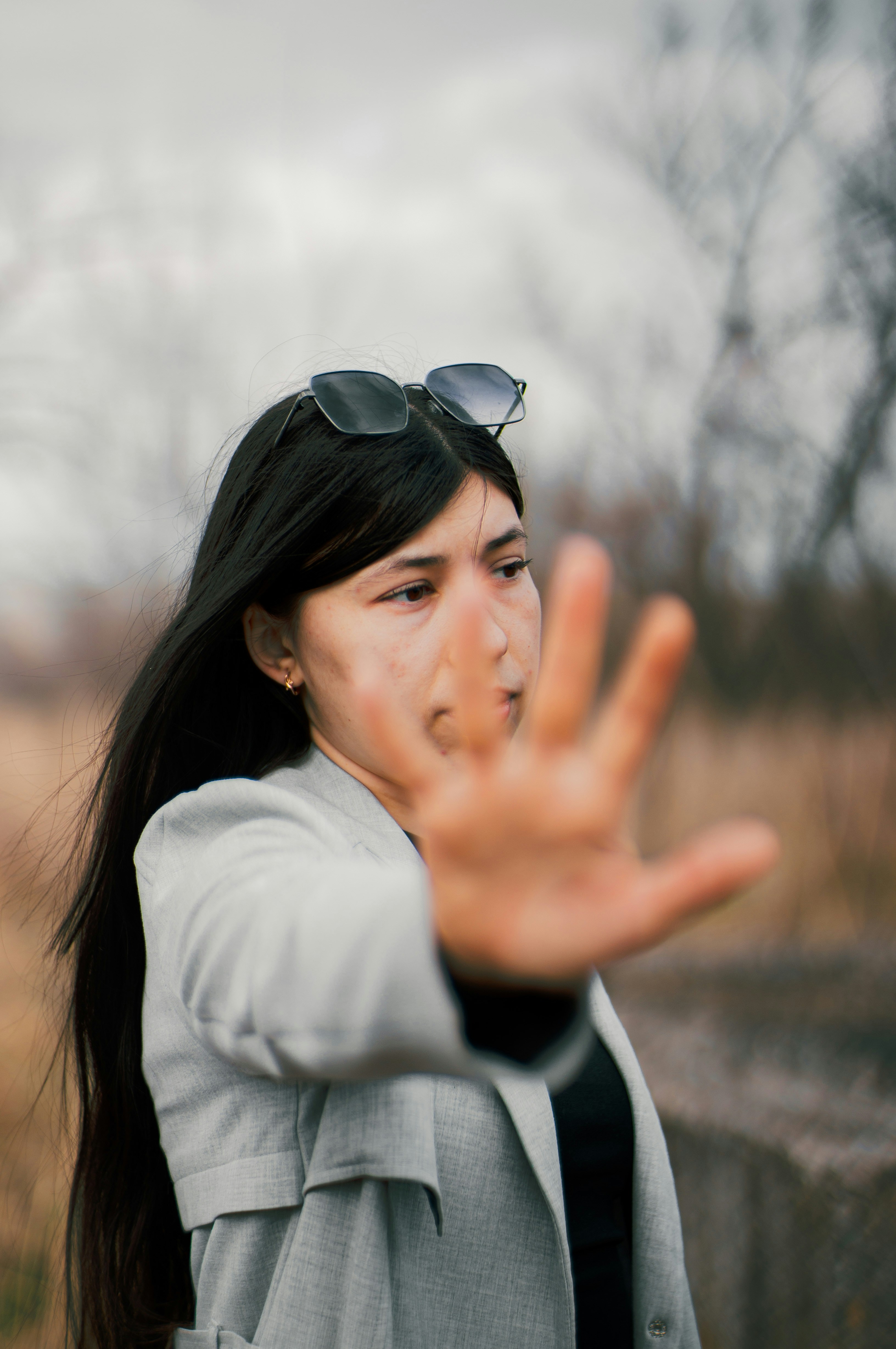 Woman is holding up her hand, signaling stop. photo – Free Portrait ...