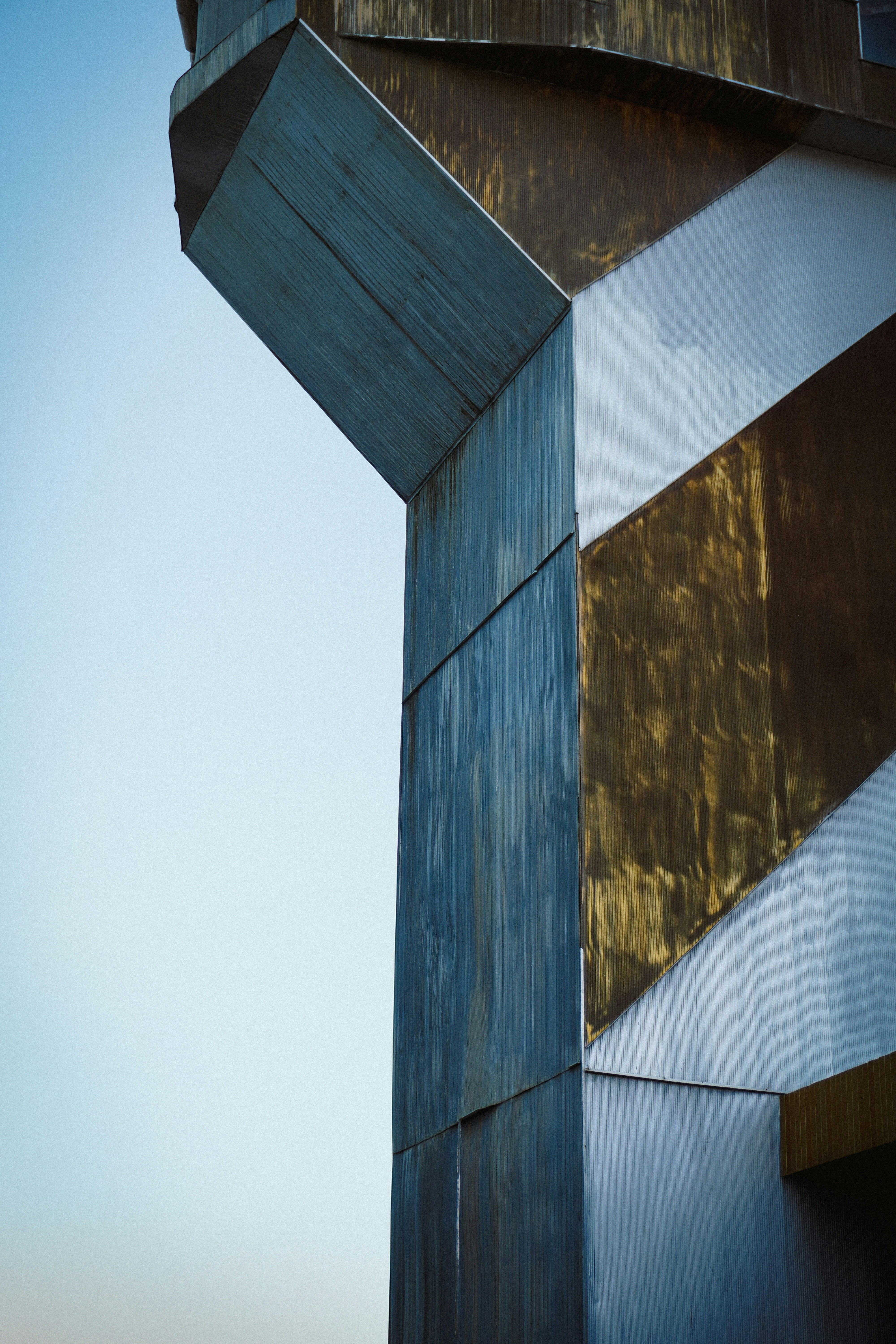 Geometric architecture angles against a blue sky. photo – Free Building ...