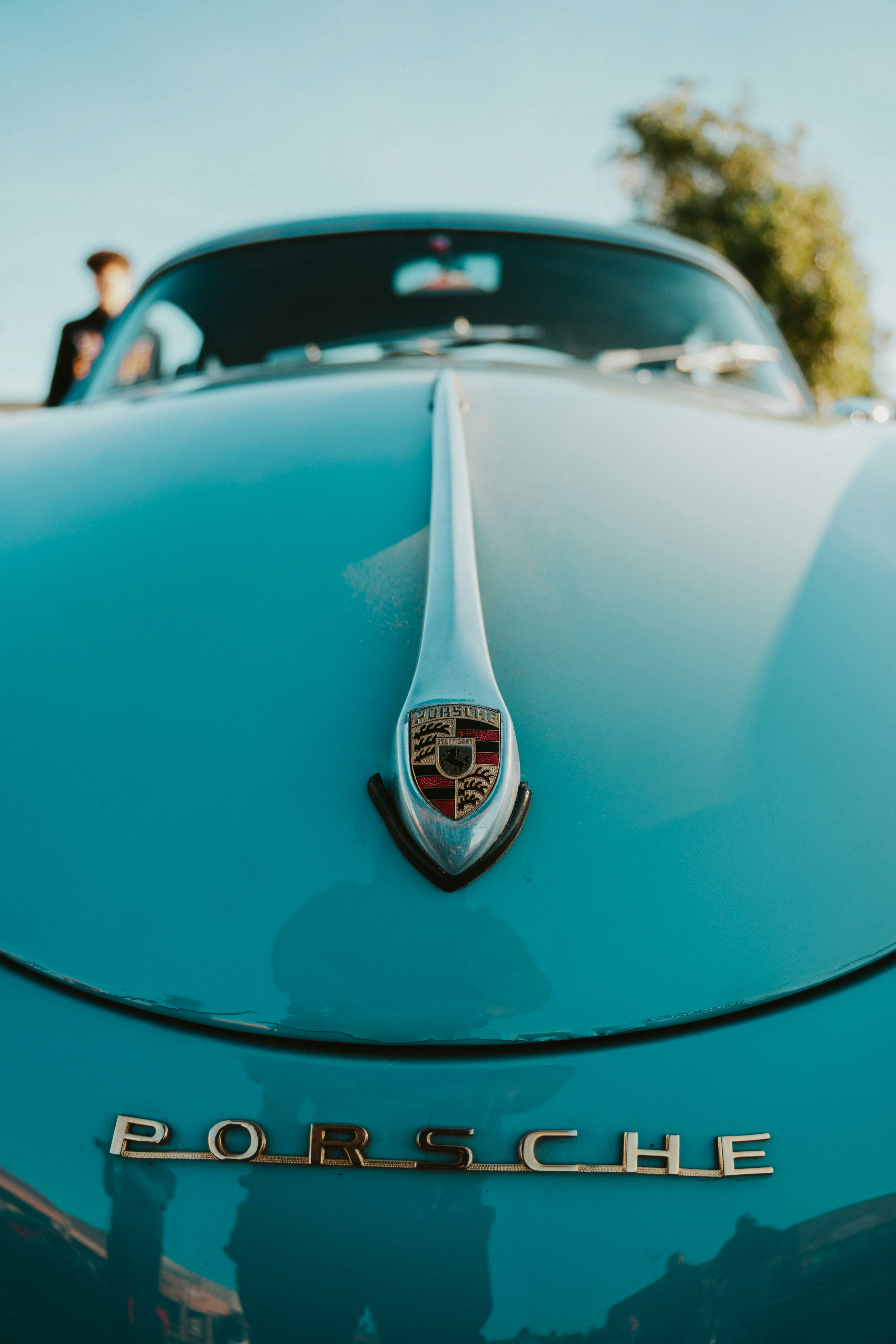  aqua vintage: the prow of a blue Porsche