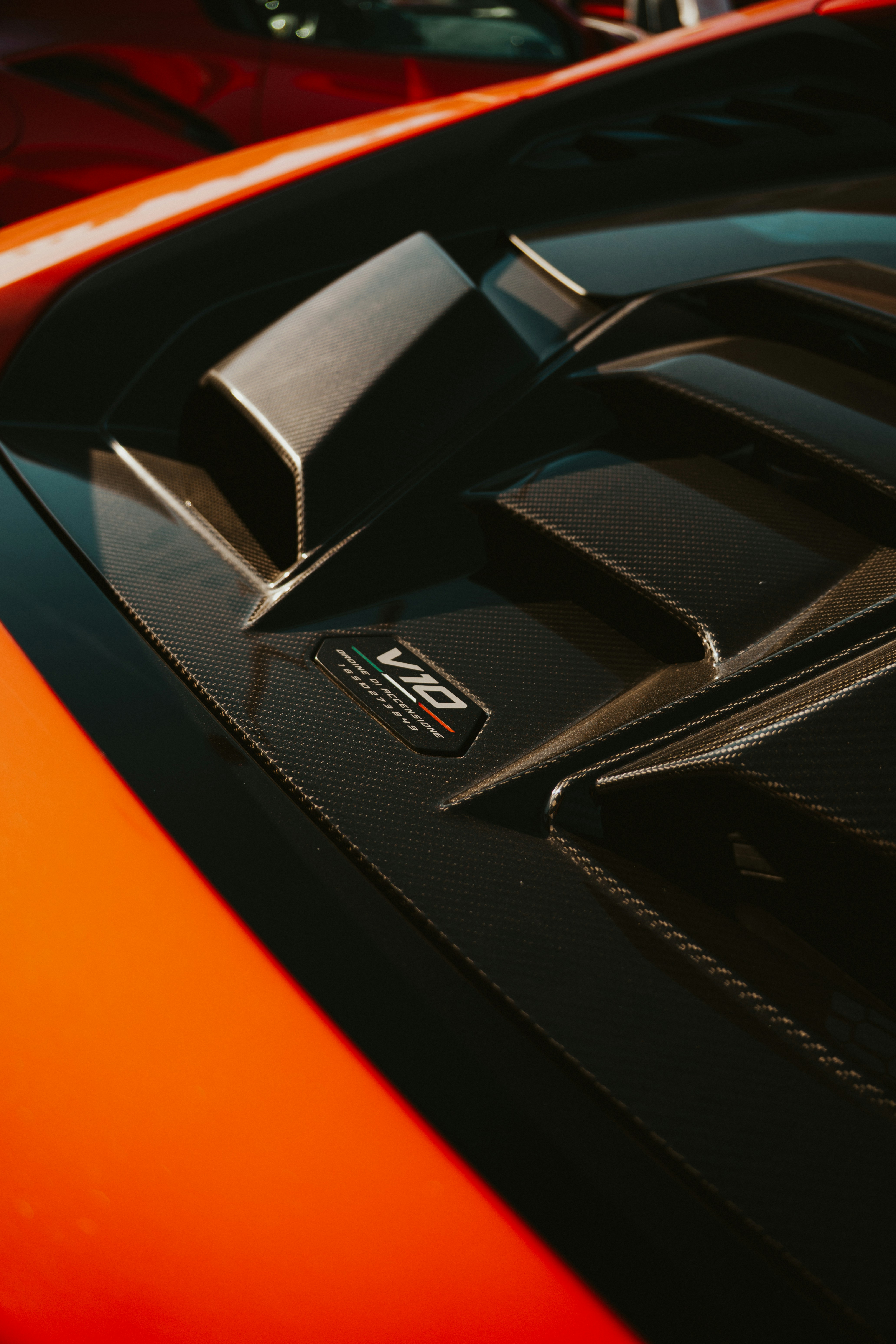 Lamborghini engine cover details. photo – Free Car Image on Unsplash