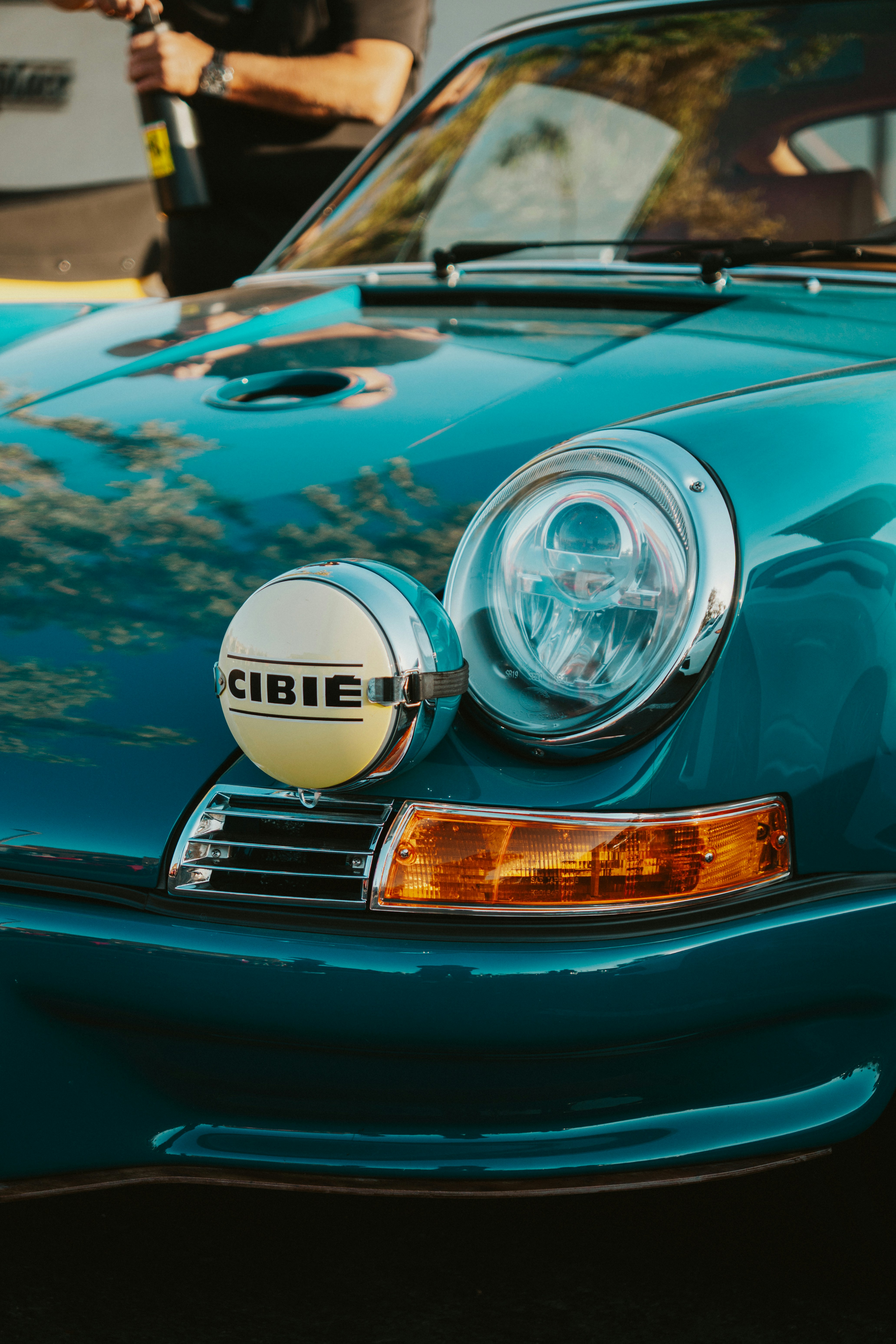 Teal Classic Headlight Portrait: Cibie Spotlight on a Vintage Front End