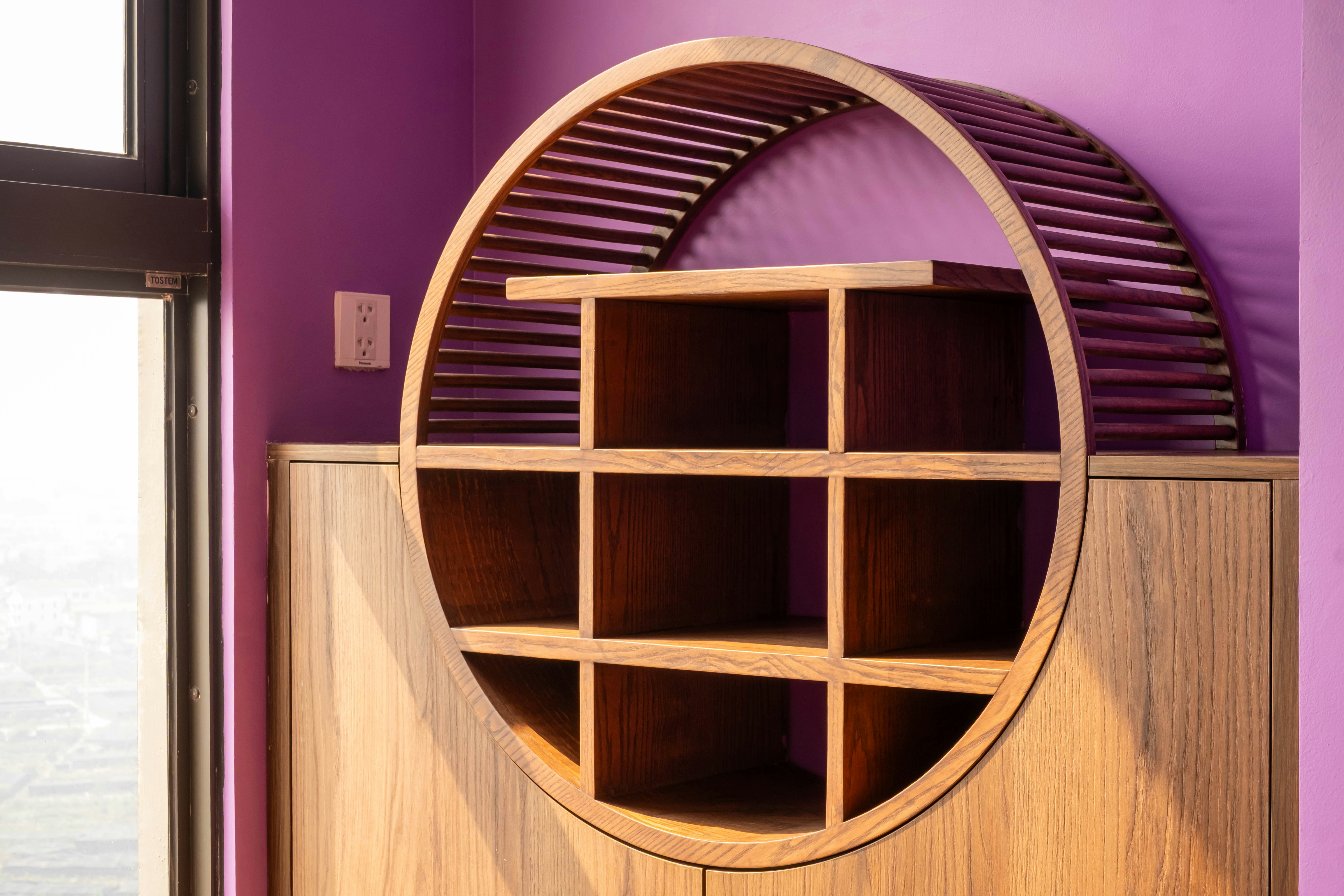 Wooden Circular Shelf: Warm Grid Within a Violet Room