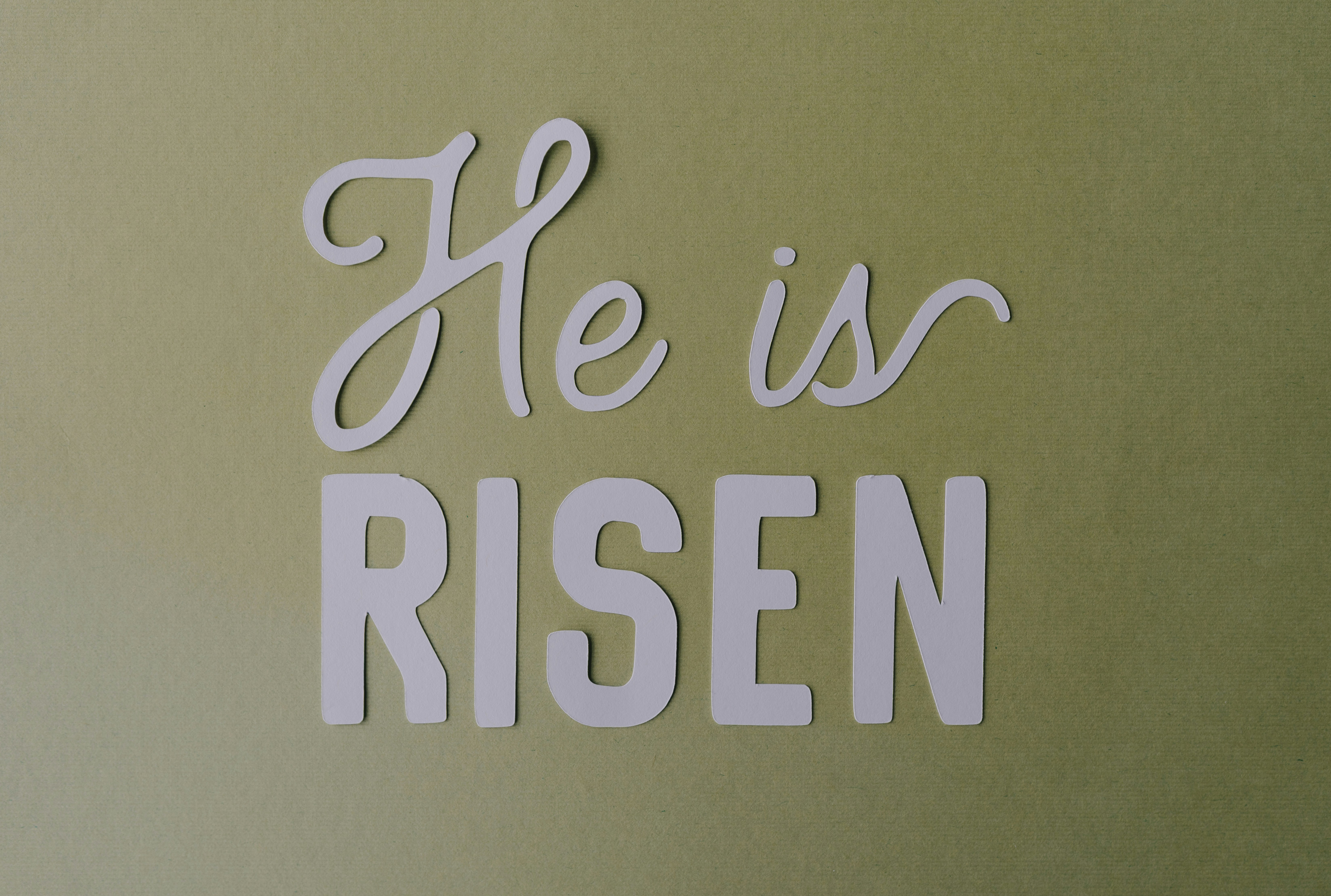 He is risen, written on a wall. photo – Free Paper Image on Unsplash