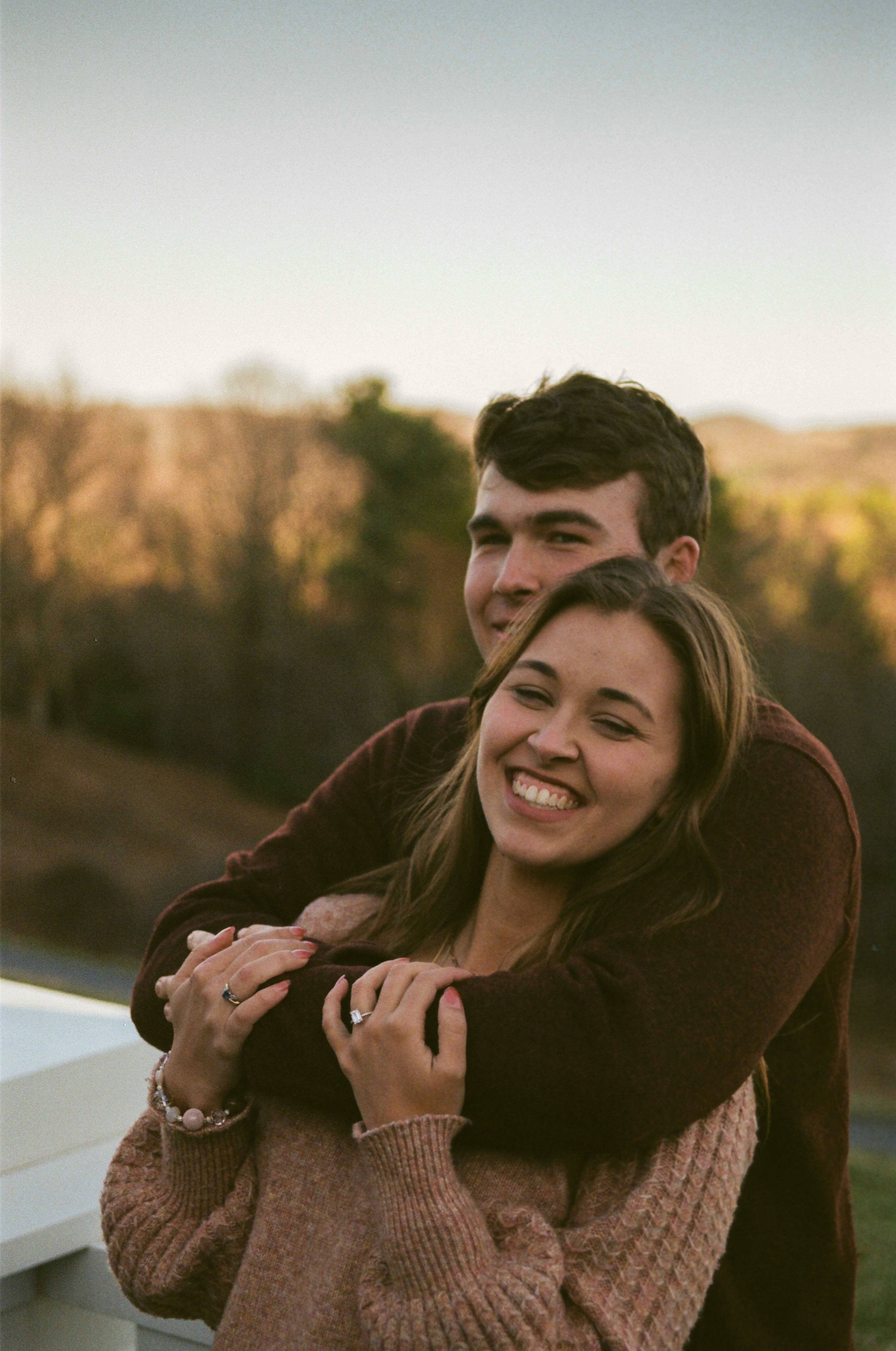 Happy couple embracing and smiling in a photo. photo – Free Woman Image ...