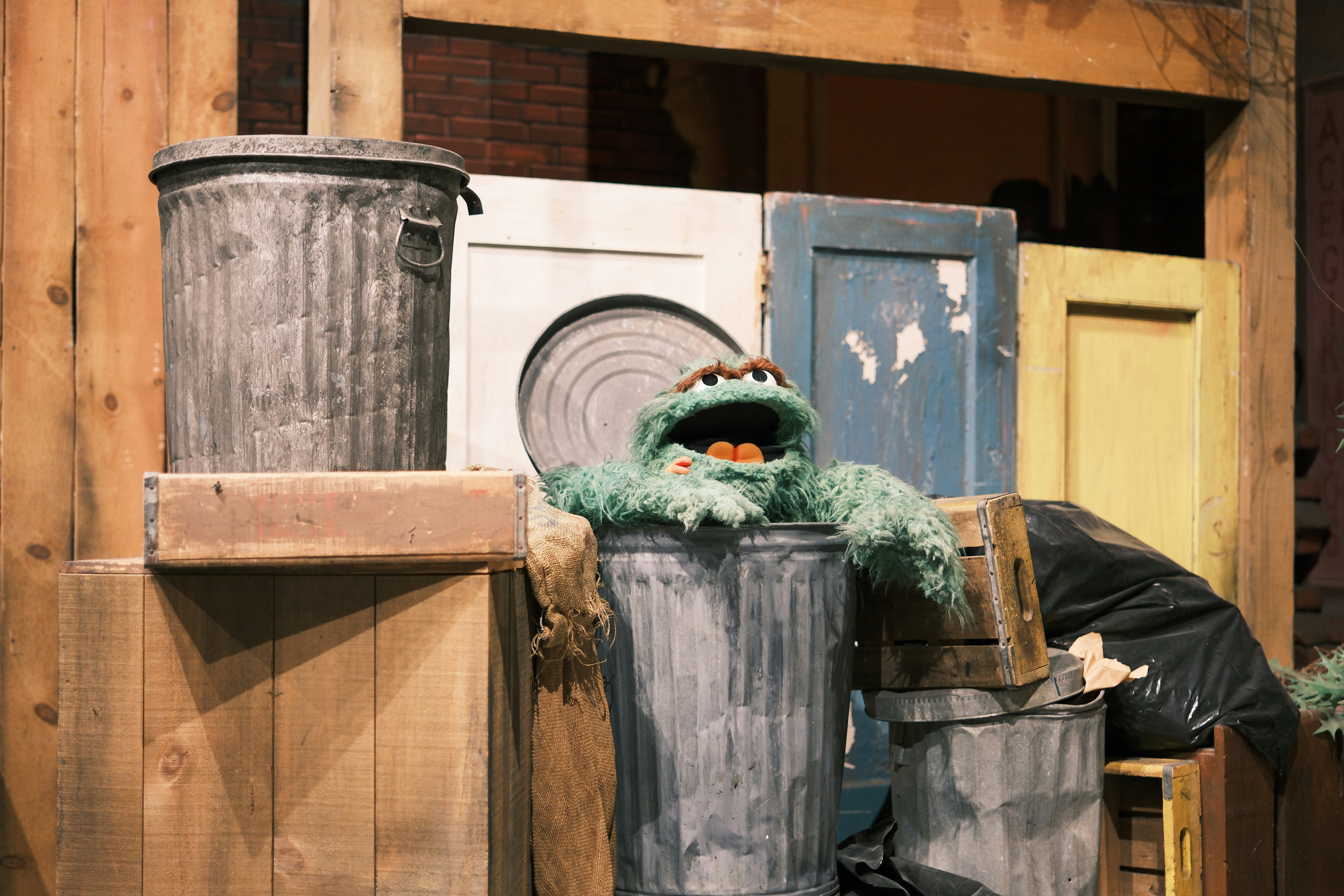 Oscar the grouch is in his trash can home. photo – Free Garbage Image ...