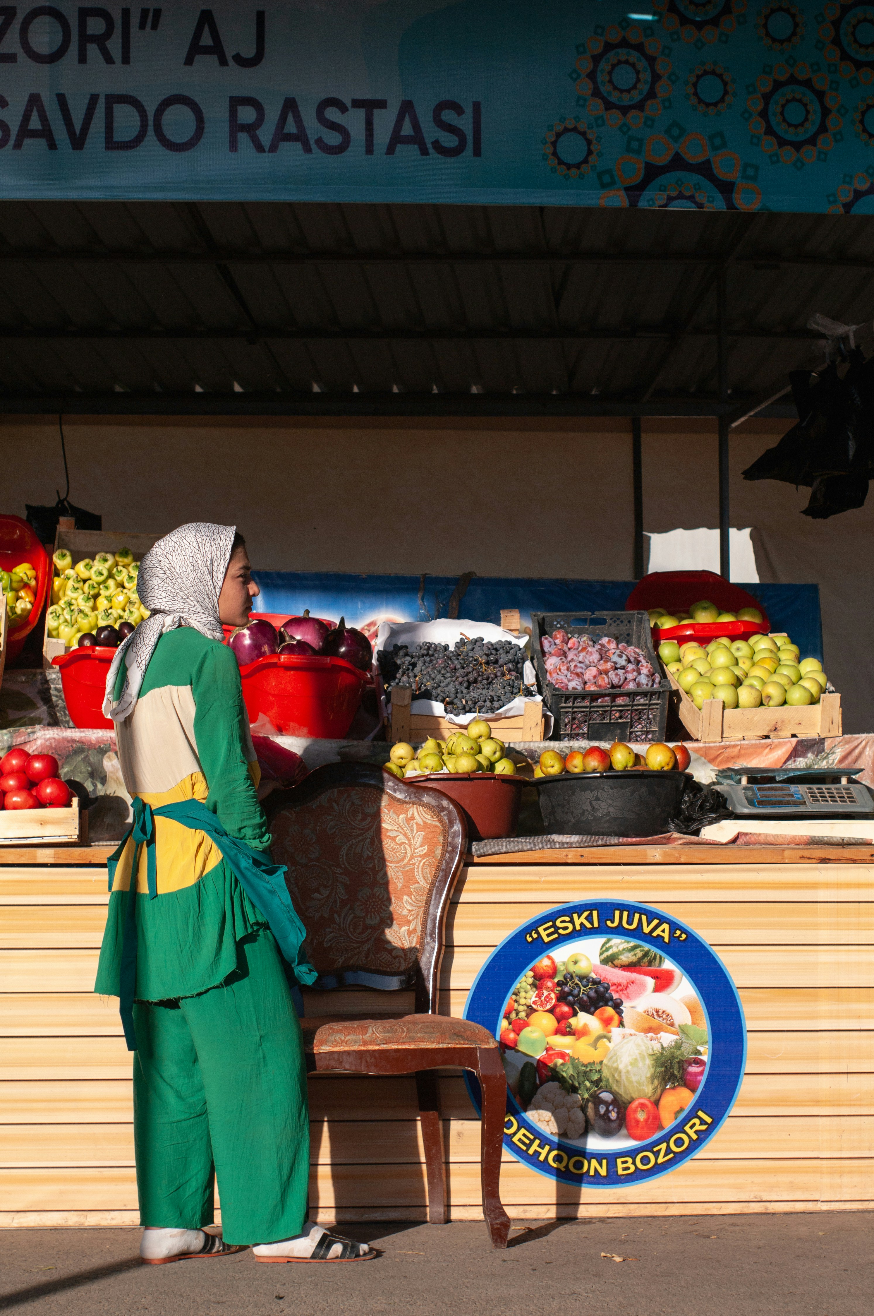 Green Attire by the Market Window